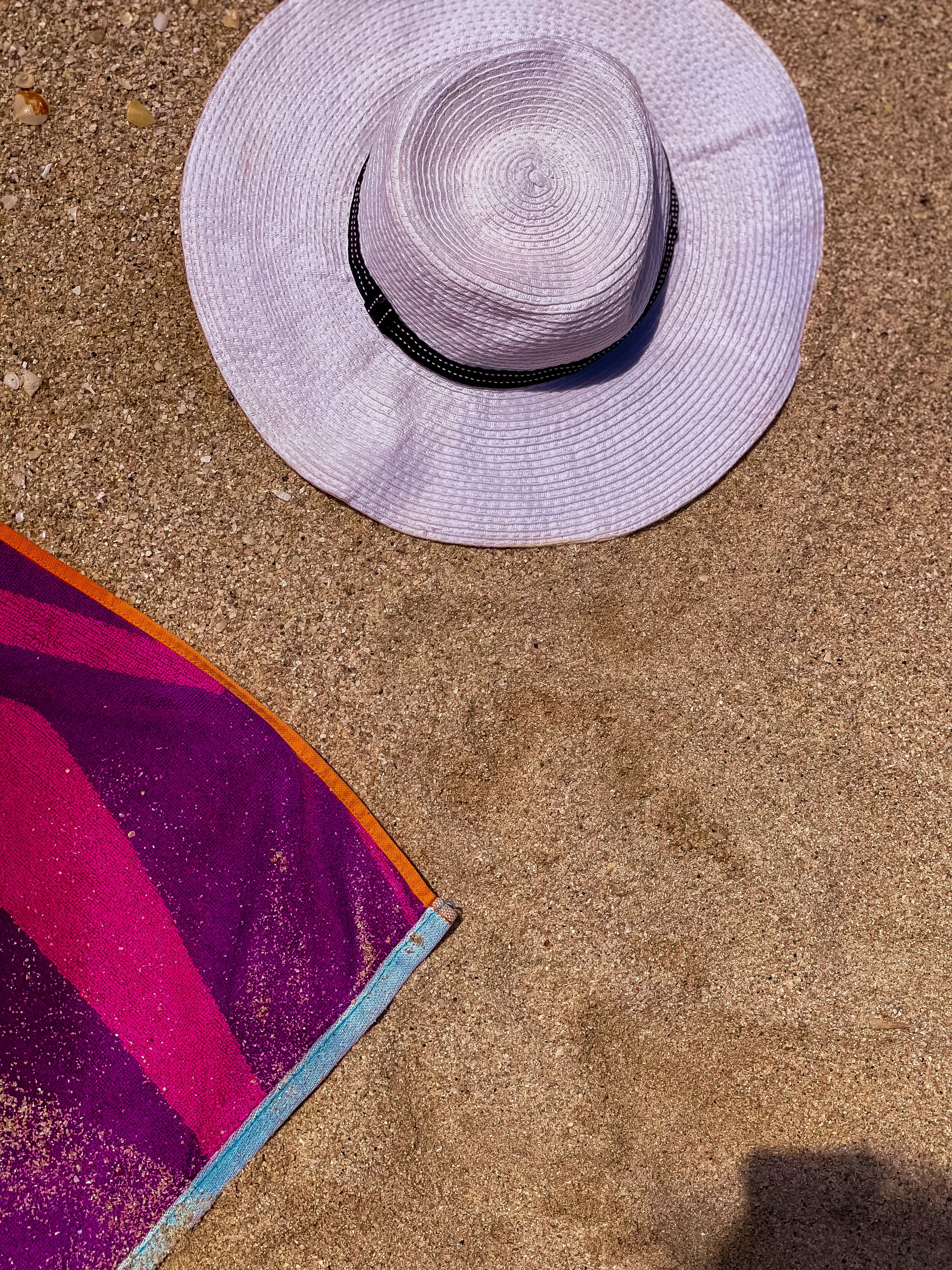Person Laying On Sand · Free Stock Photo