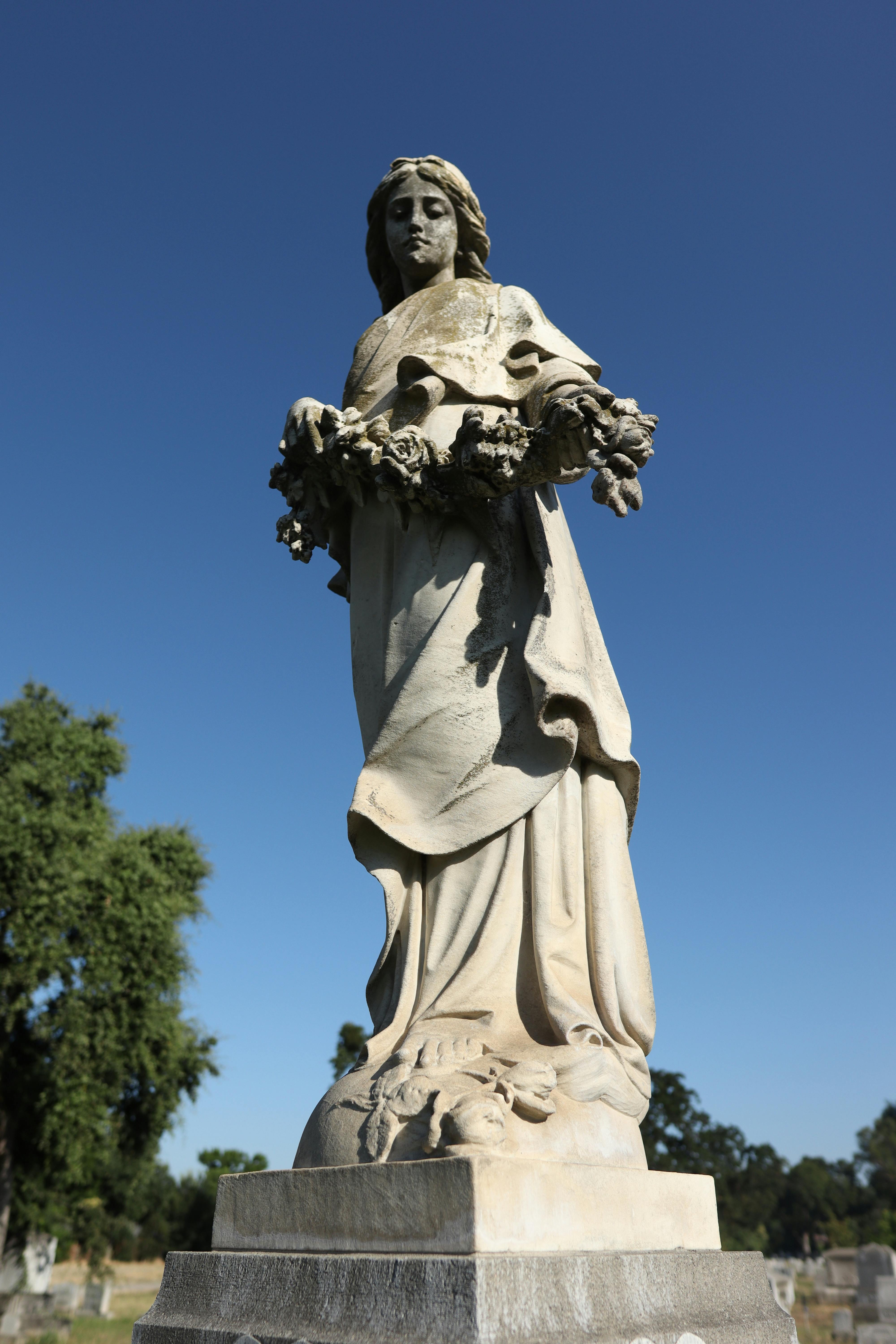 Statue of Standing Woman on Cemetery · Free Stock Photo