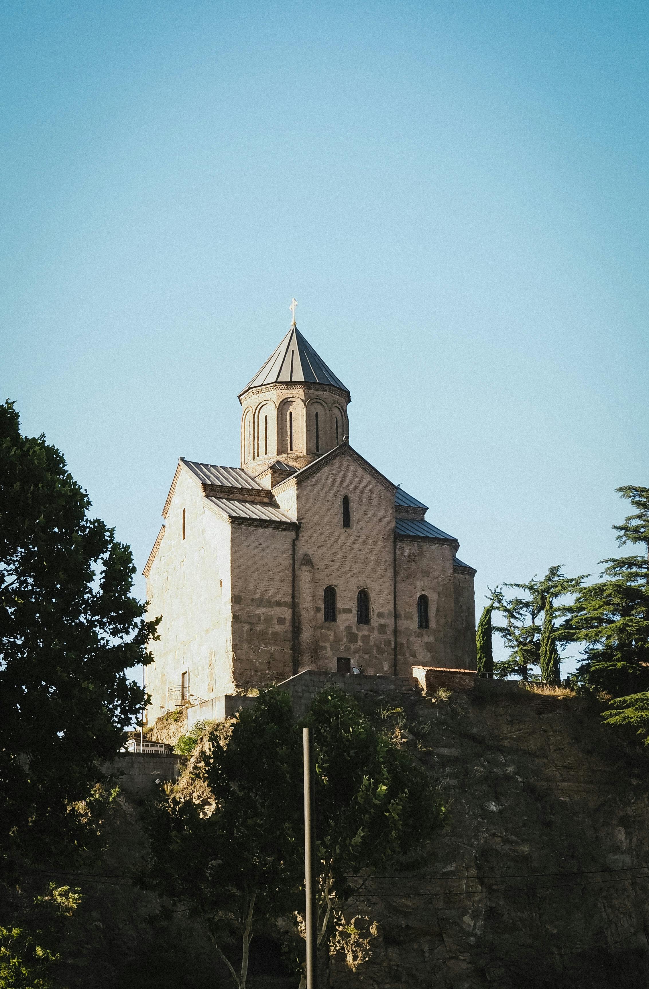 Building and Tower behind in Tbilisi · Free Stock Photo