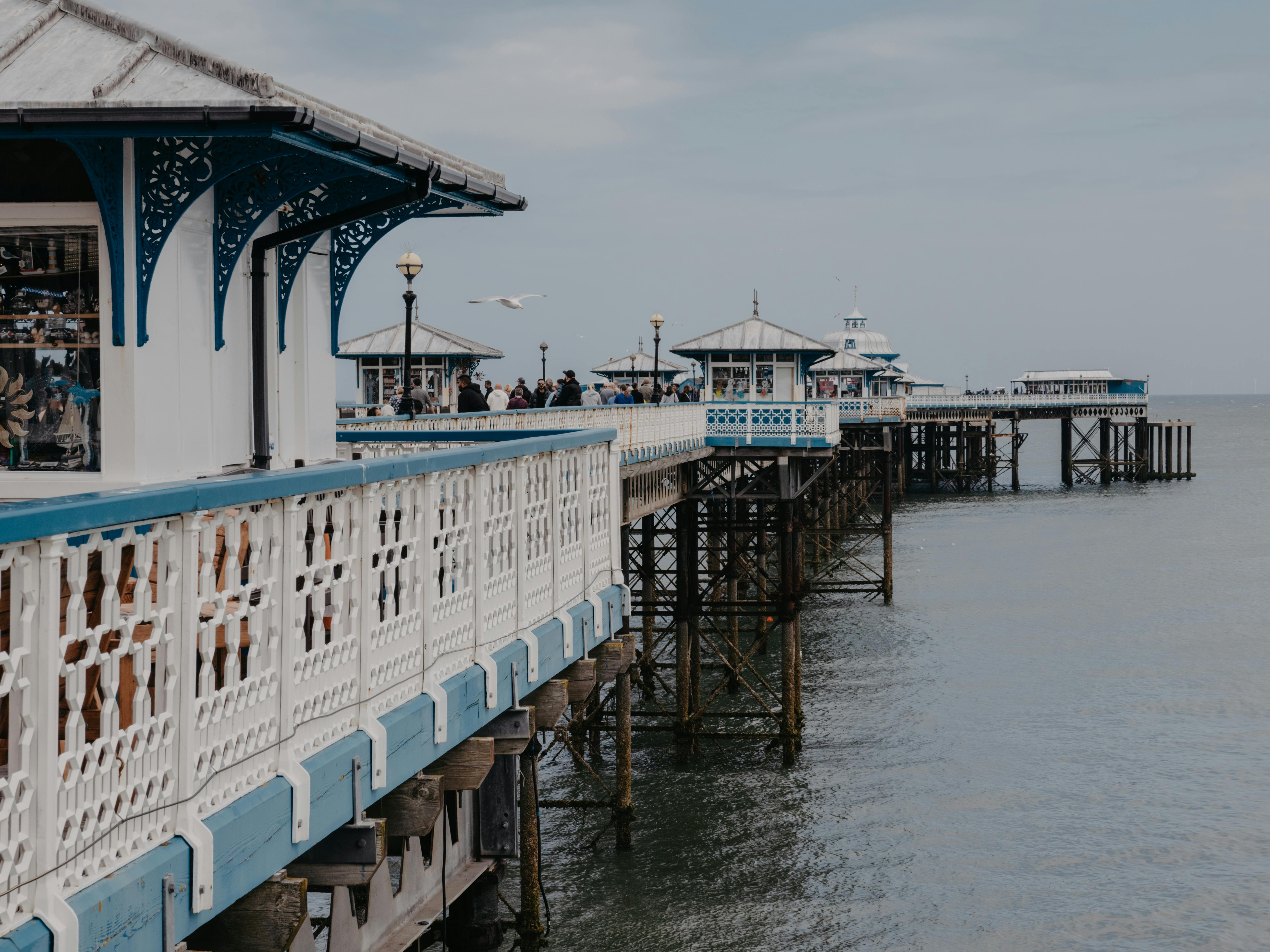 Puddles on Empty Pier on Sea Shore · Free Stock Photo