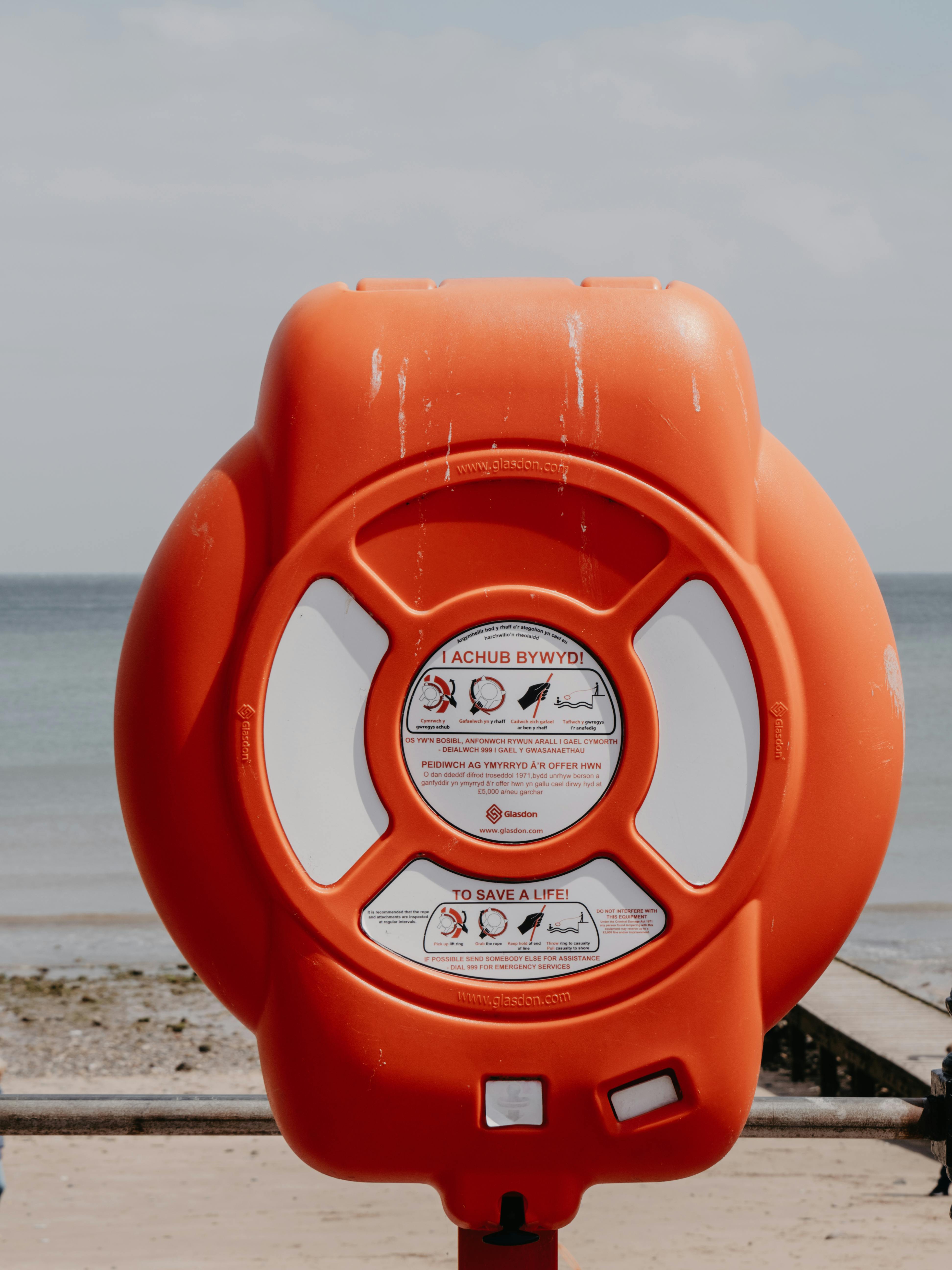 Lifebuoy in Case on Sea Shore · Free Stock Photo