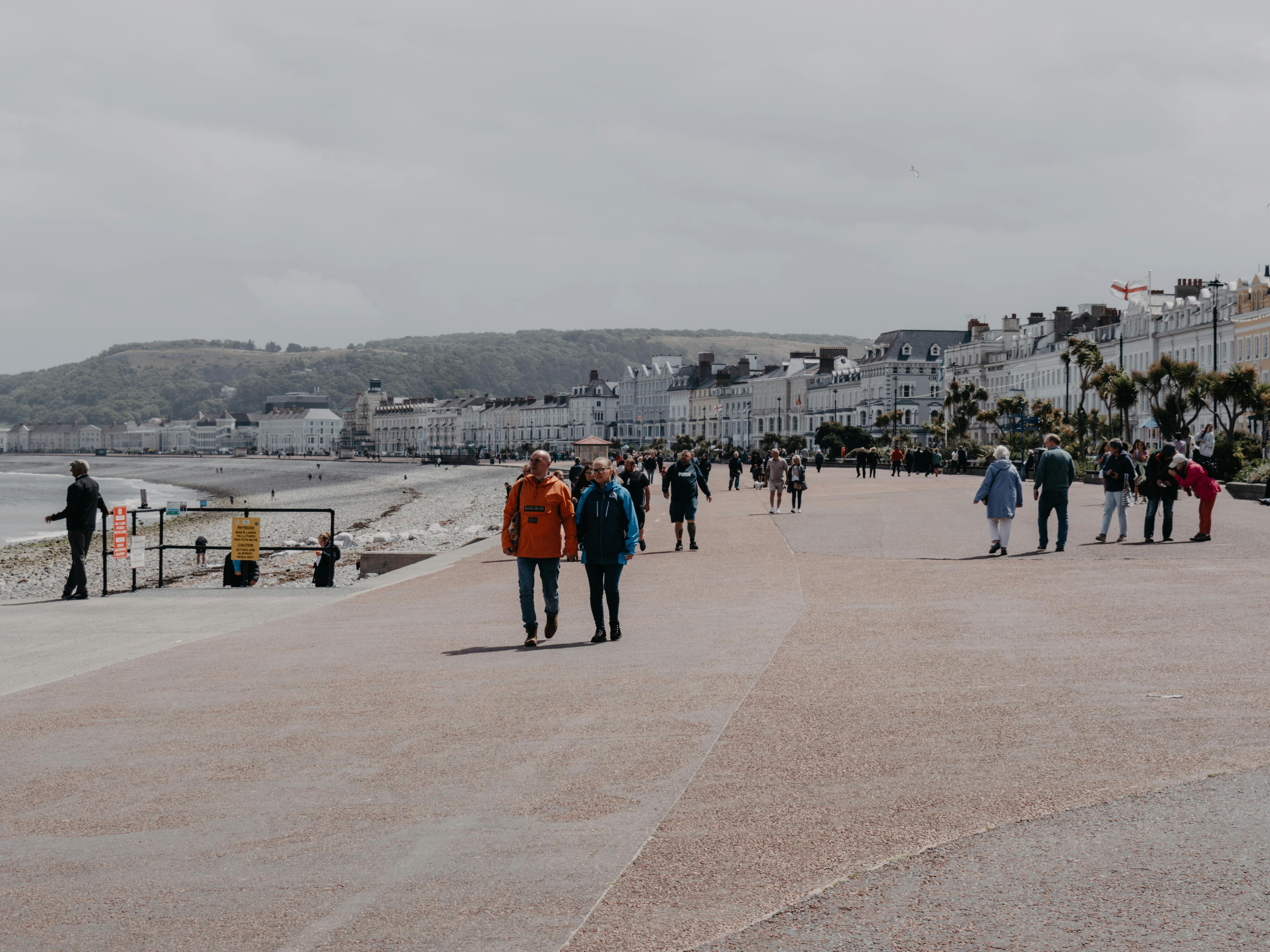 Group of people walking through square · Free Stock Photo