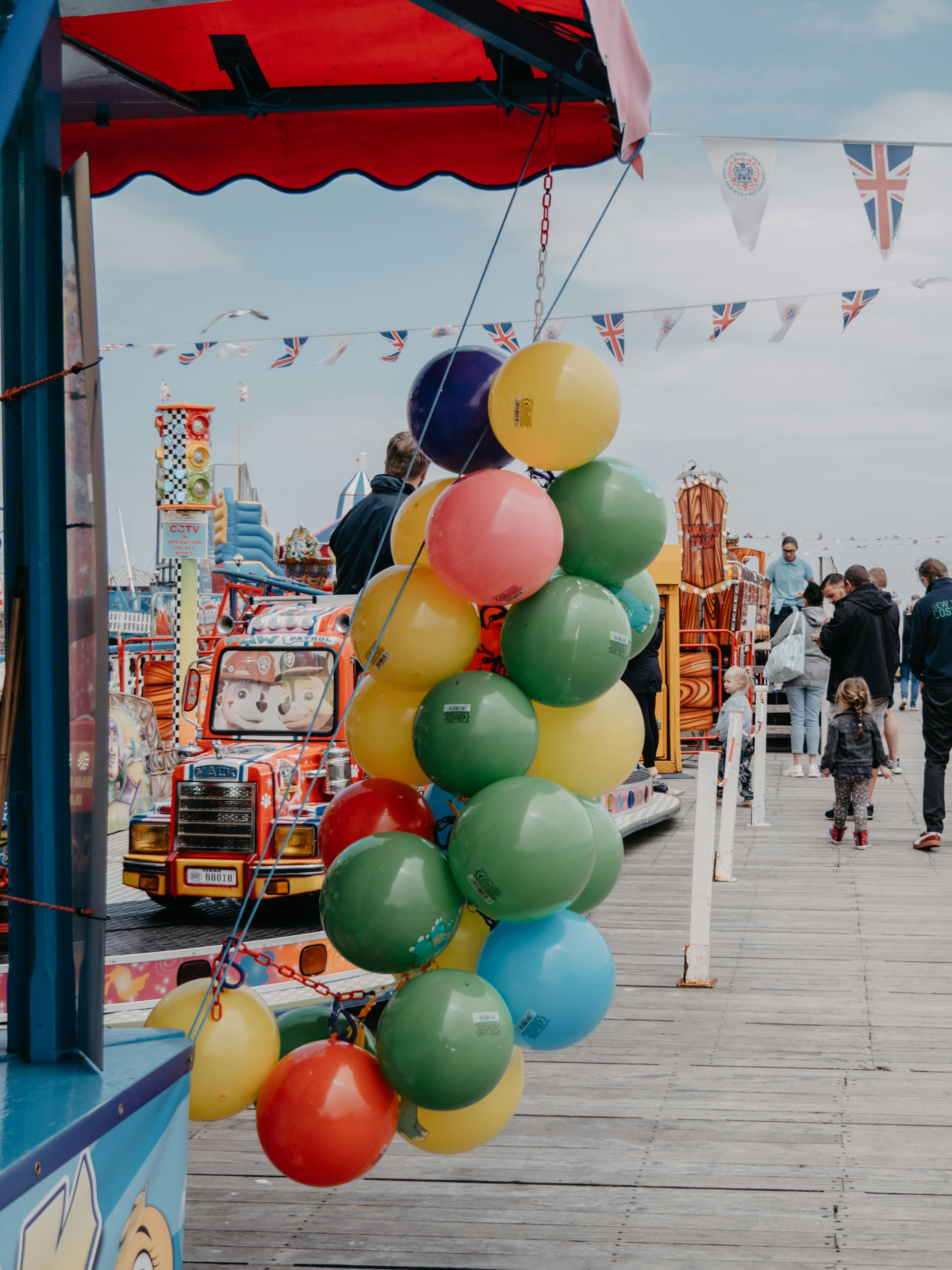 Colorful Balloons on Pier · Free Stock Photo