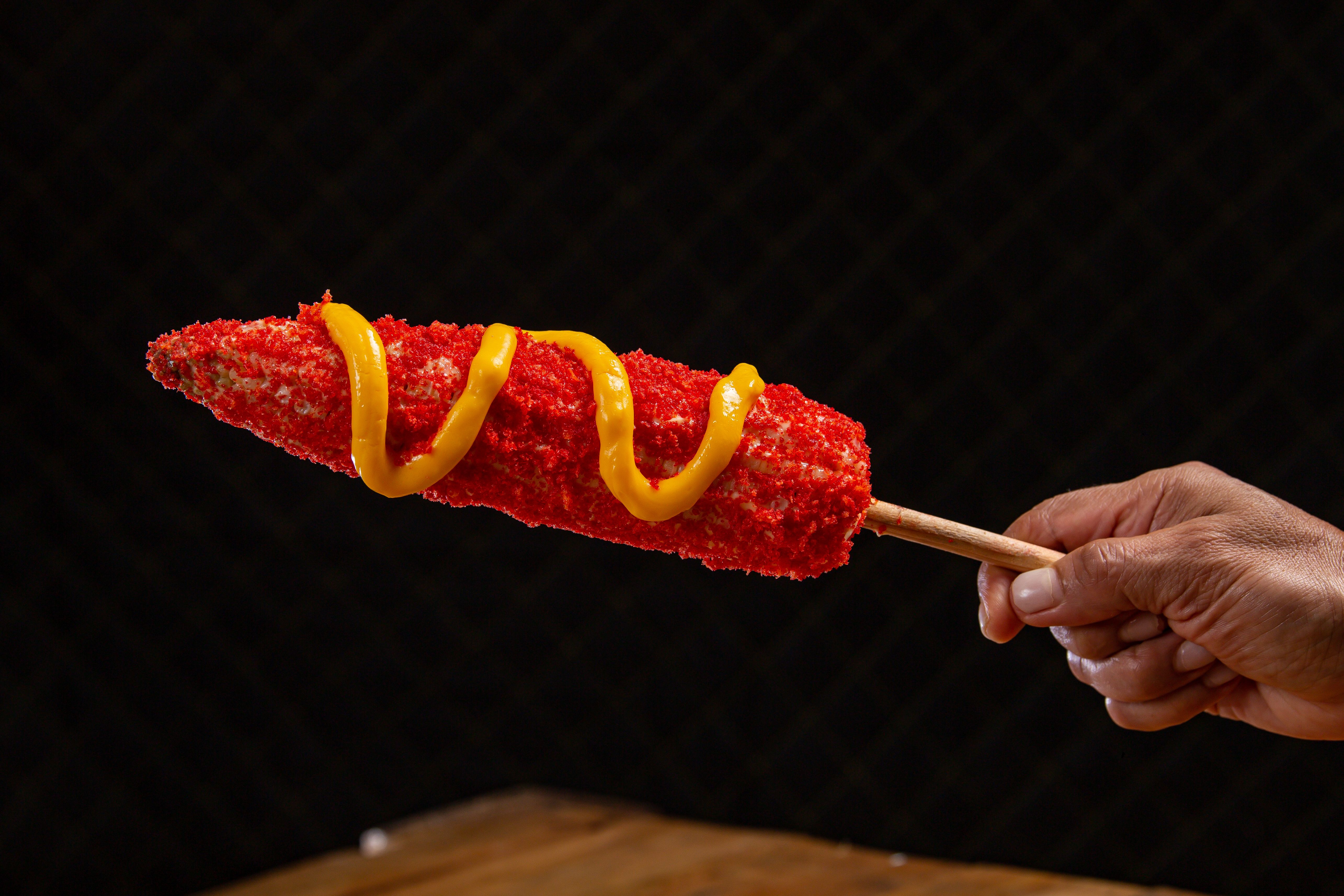 Corn Dog with Mustard · Free Stock Photo