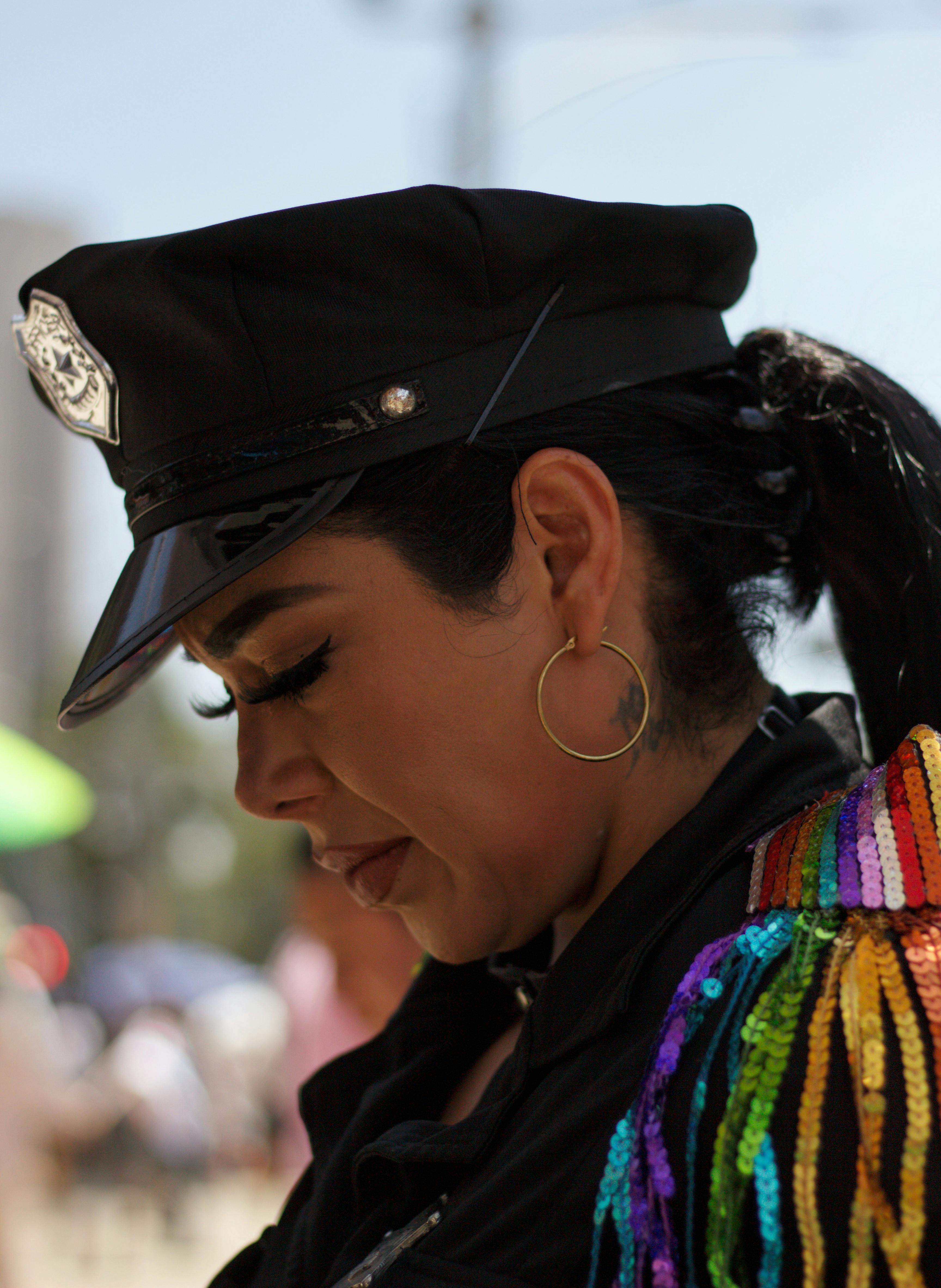 Woman in Police Officer Cap · Free Stock Photo