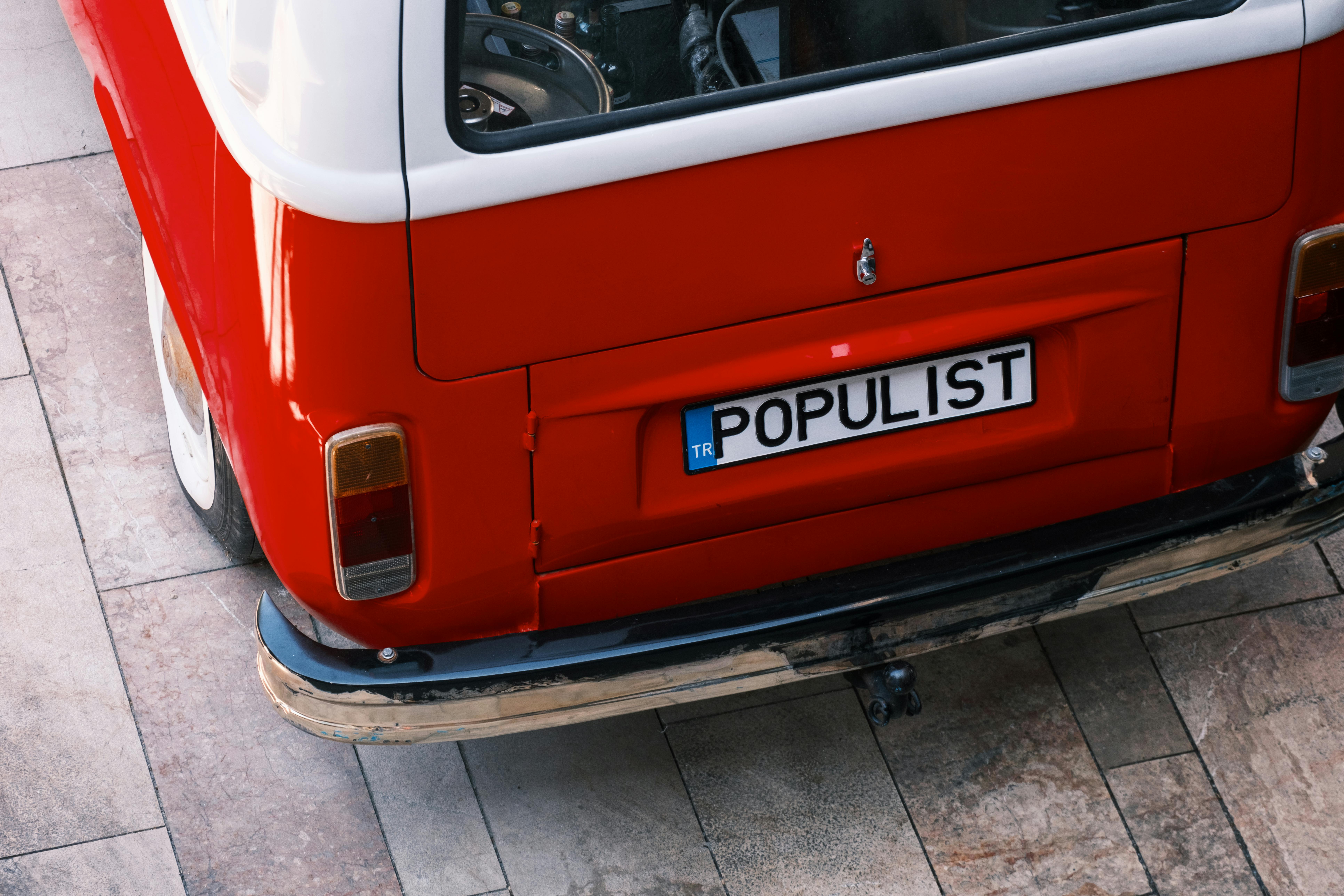 Rear of Red and White Vintage Volkswagen Minibus with a Funny Number ...