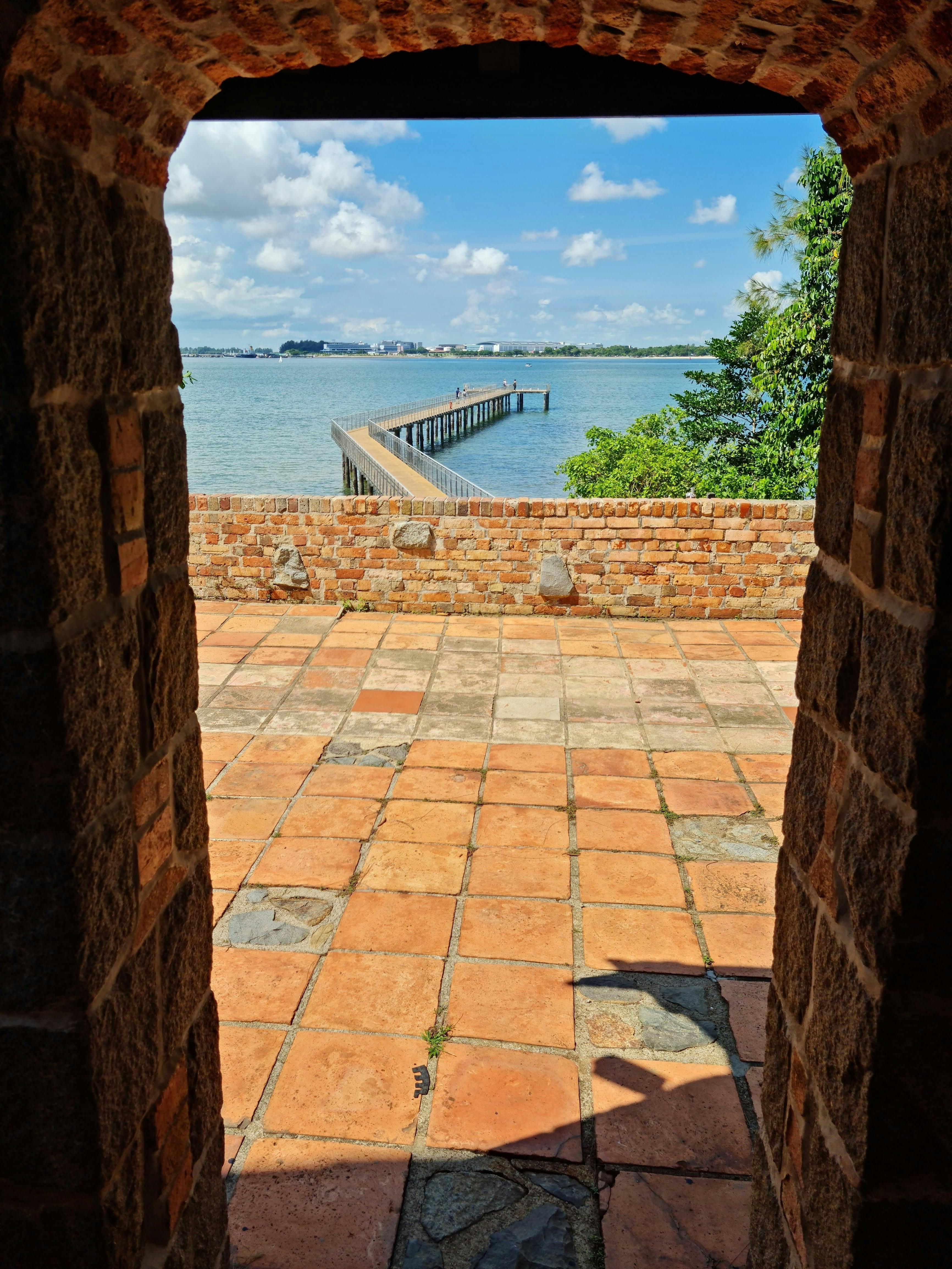 Seascape with a Wooden Peer Seen through a Doorway of an Ancient ...