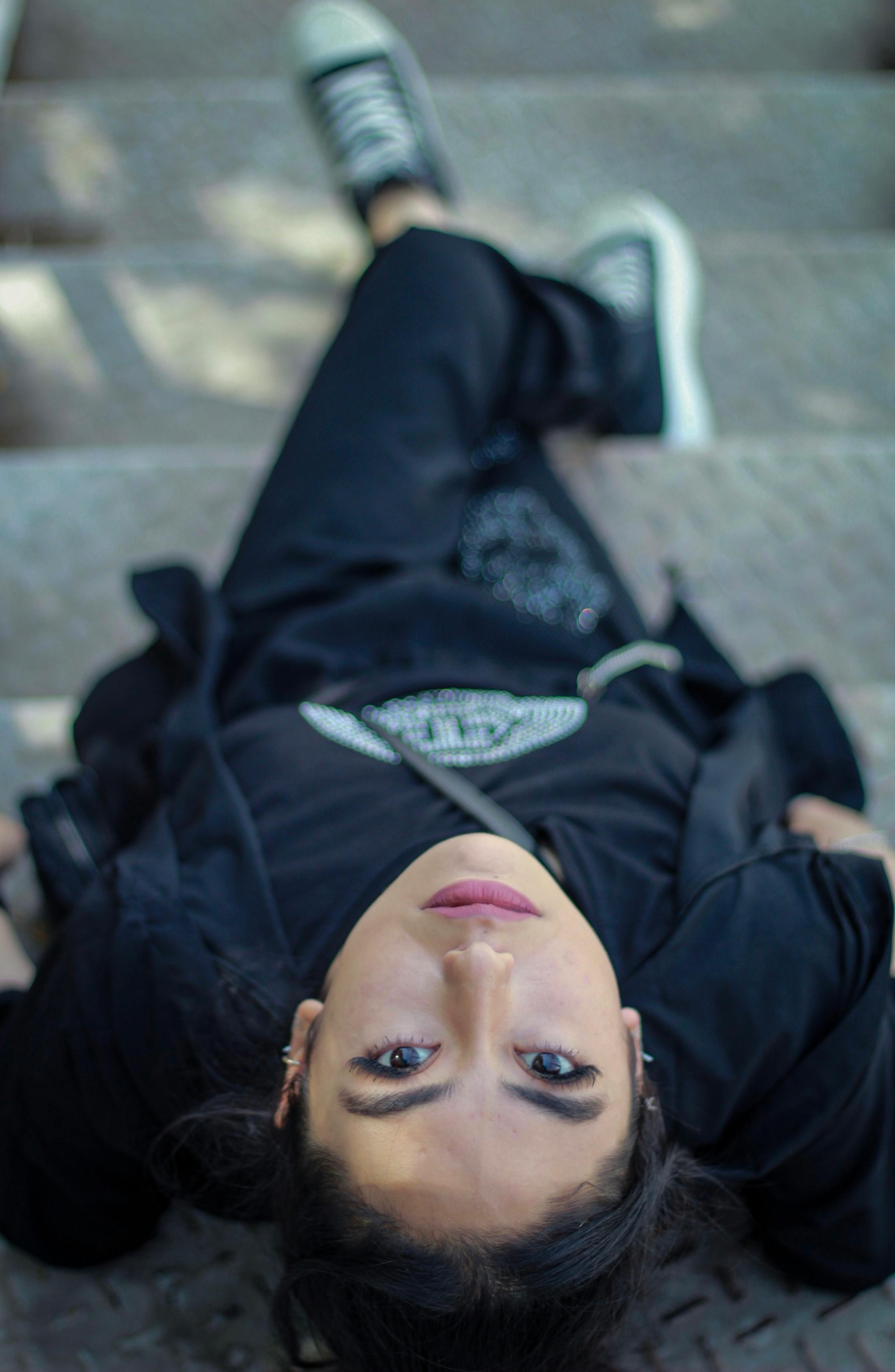 Woman Wearing Green Dress Posing on a Street · Free Stock Photo