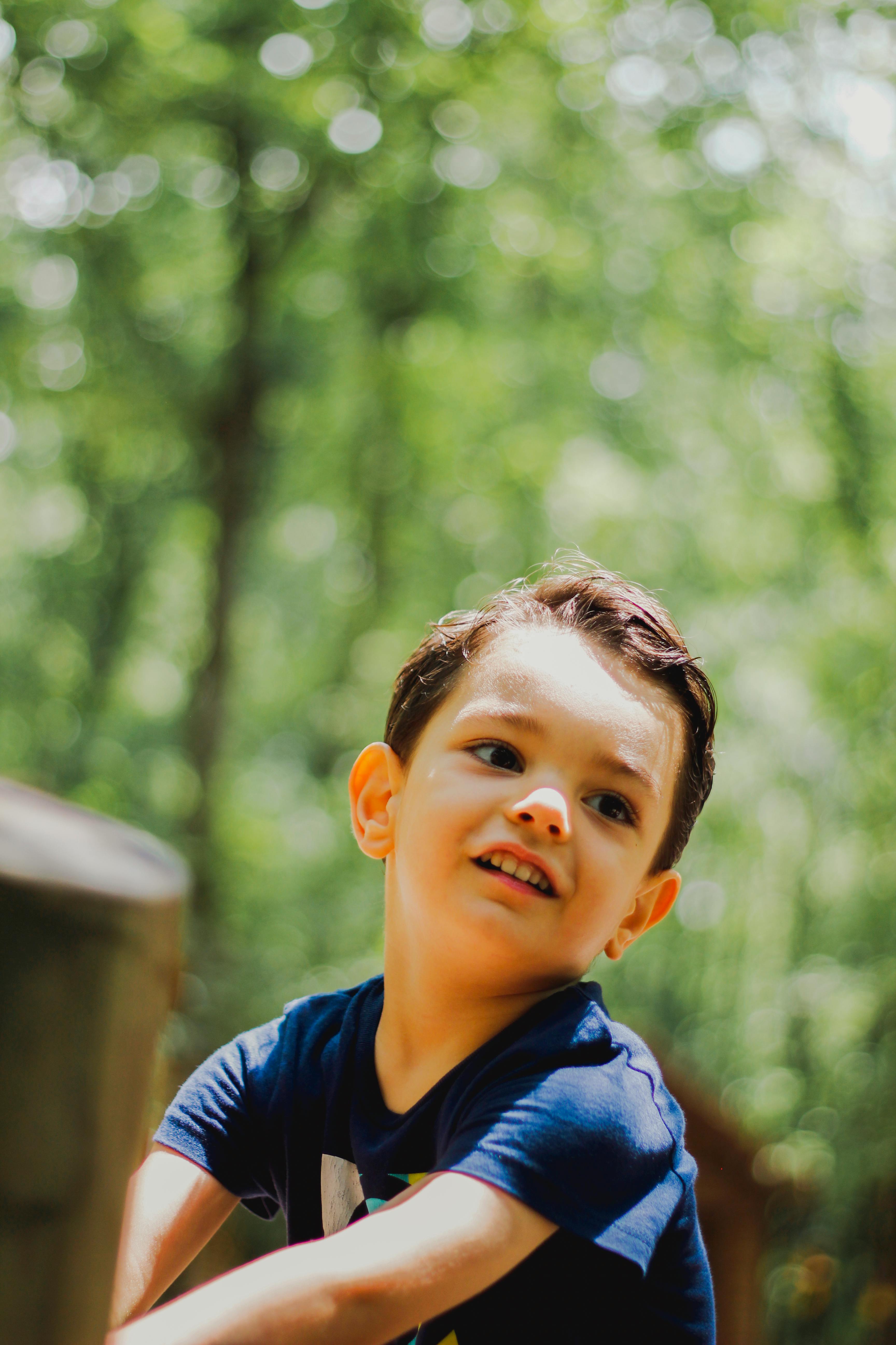 Portrait of a Boy in a Forest · Free Stock Photo