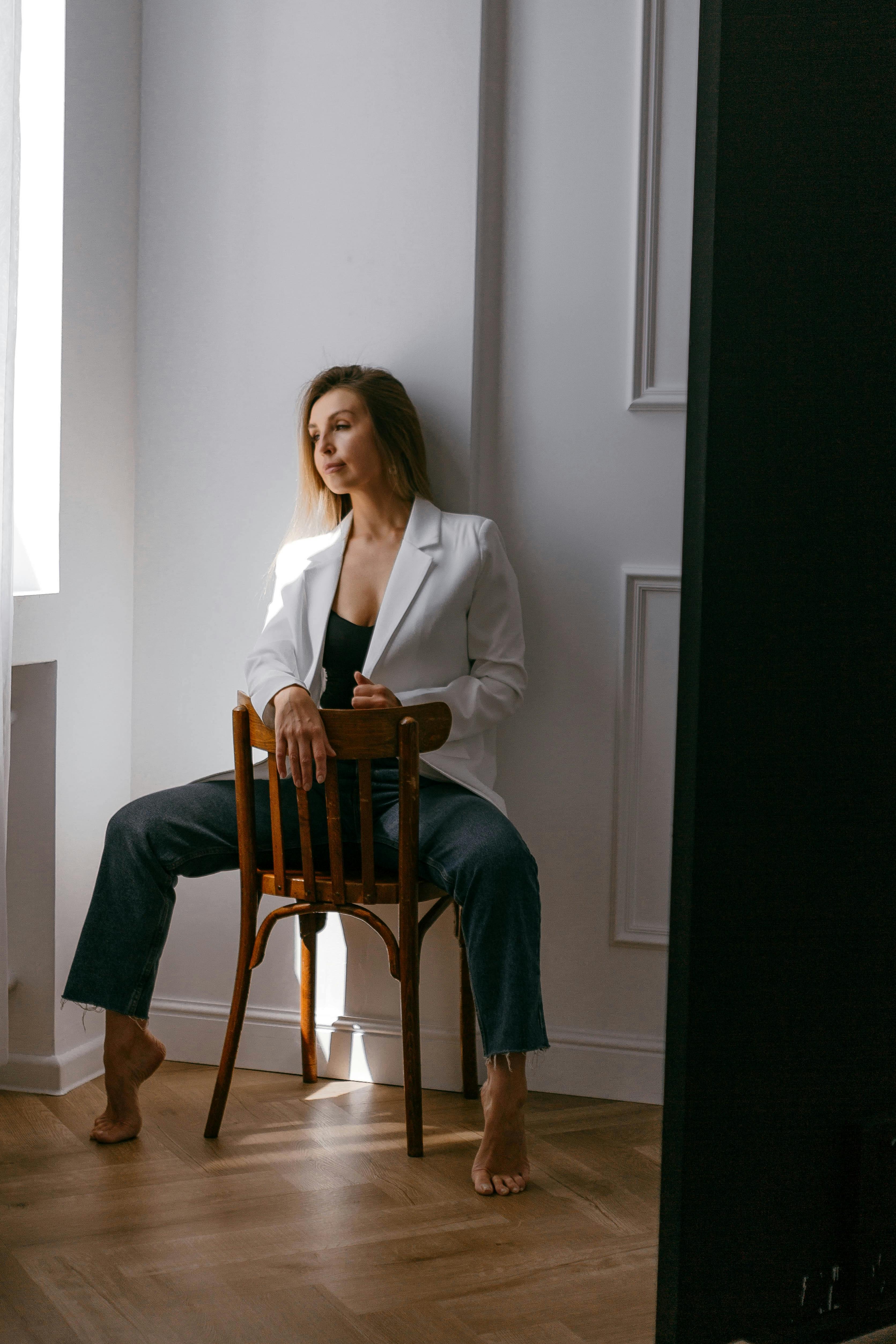 Blonde Woman Posing on a Chair · Free Stock Photo