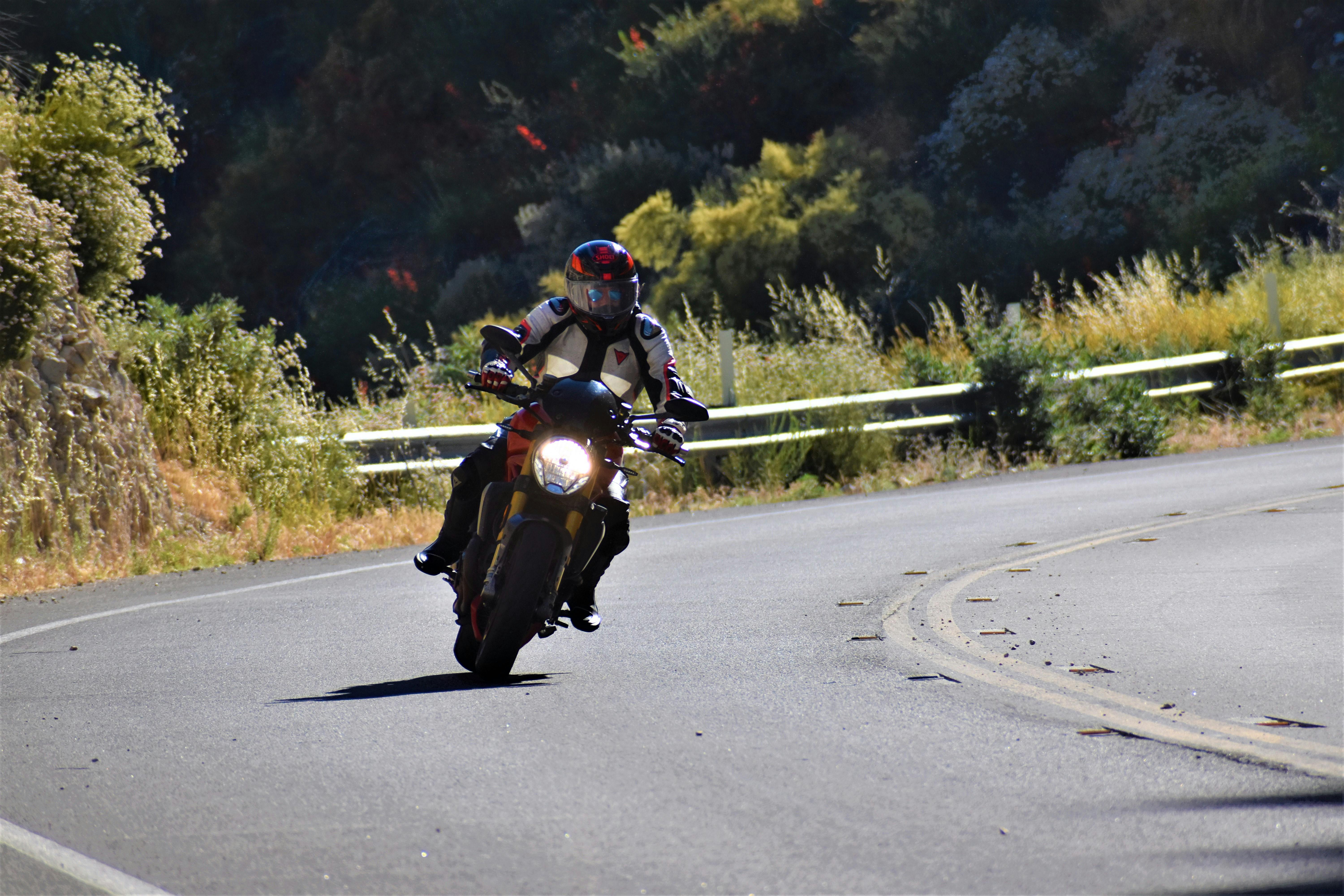 Person Riding Motorcycle during Golden Hour · Free Stock Photo
