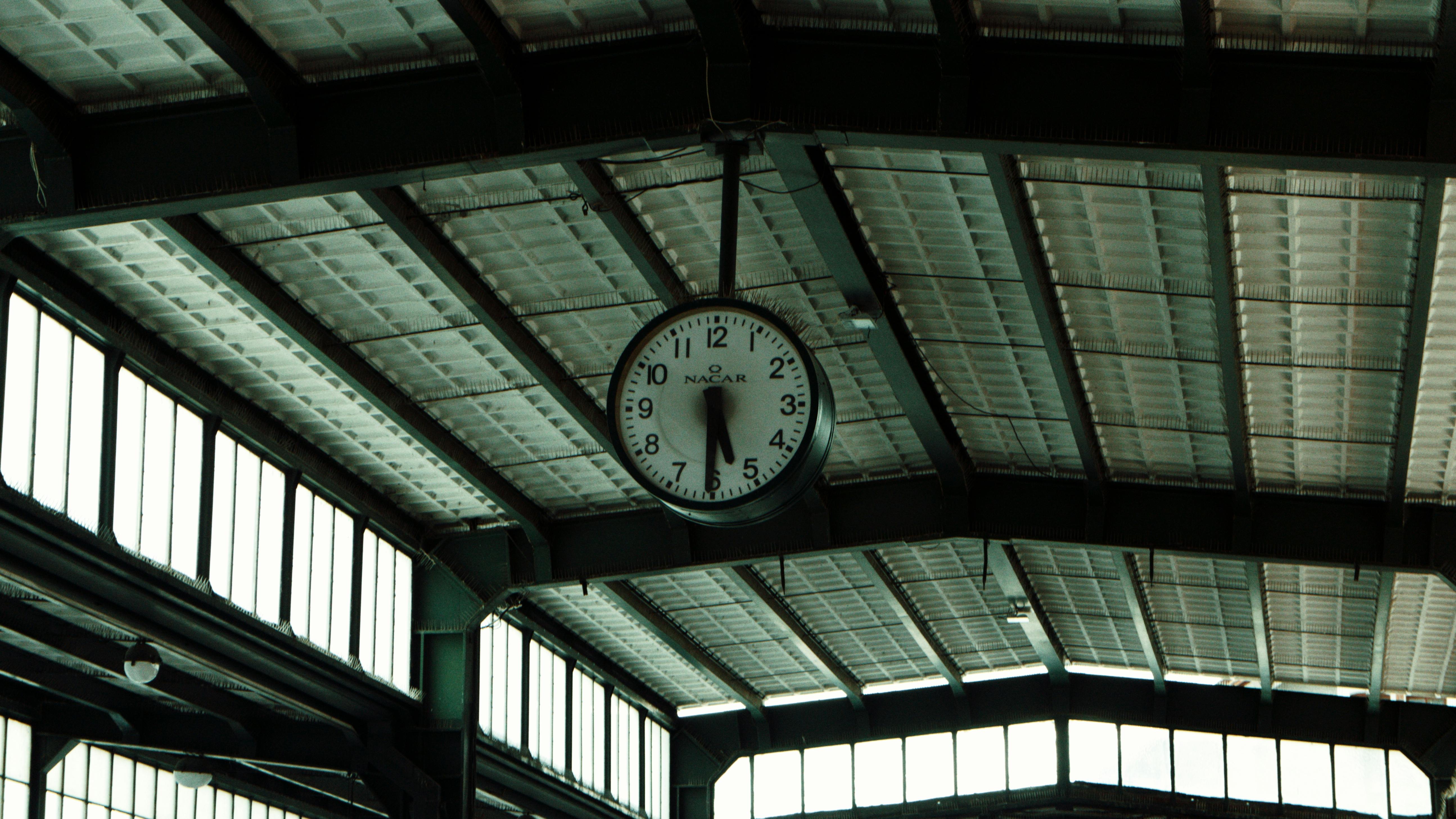 Clock Hanging under Ceiling · Free Stock Photo