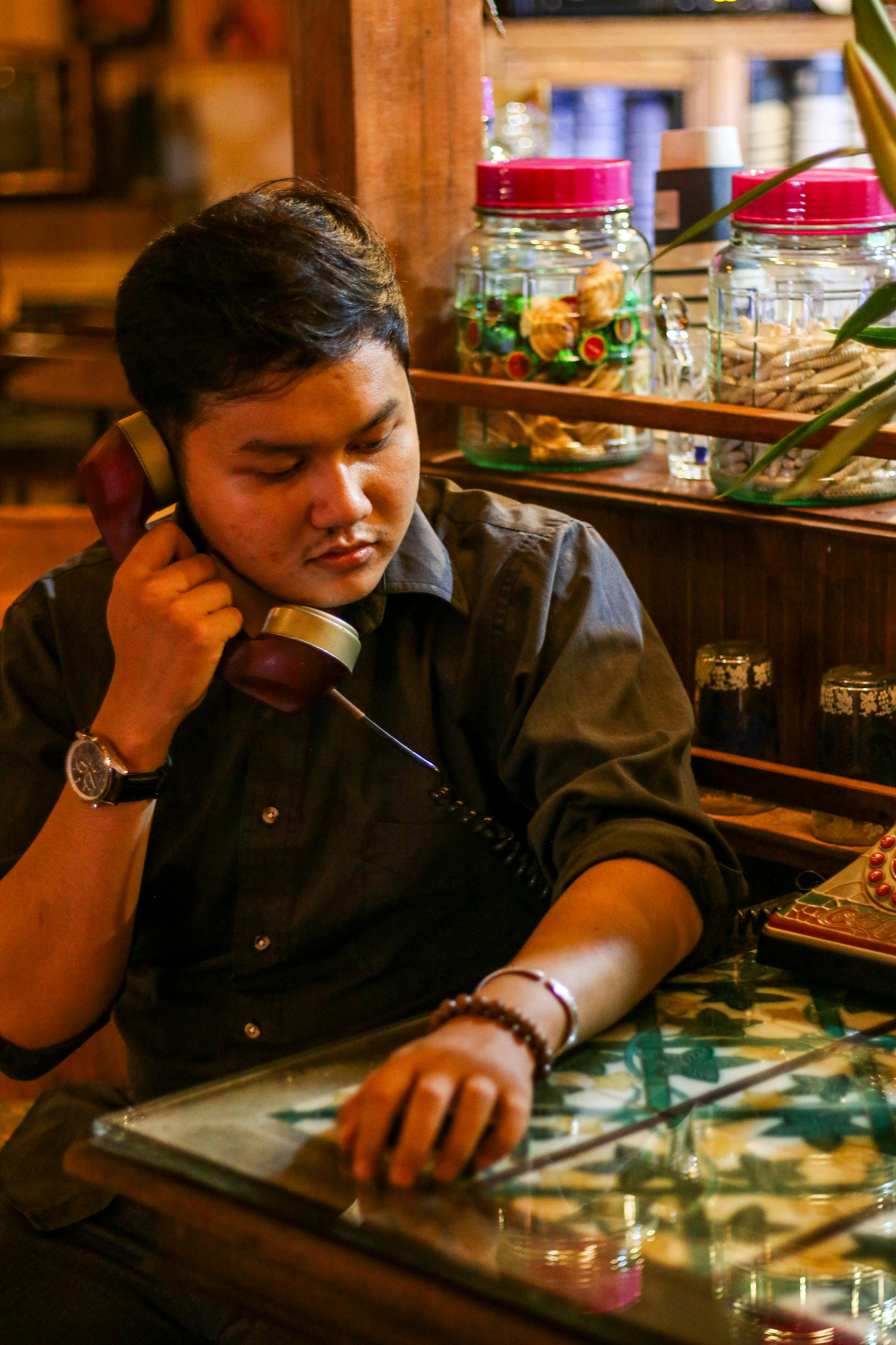Man Sitting on Carpet · Free Stock Photo