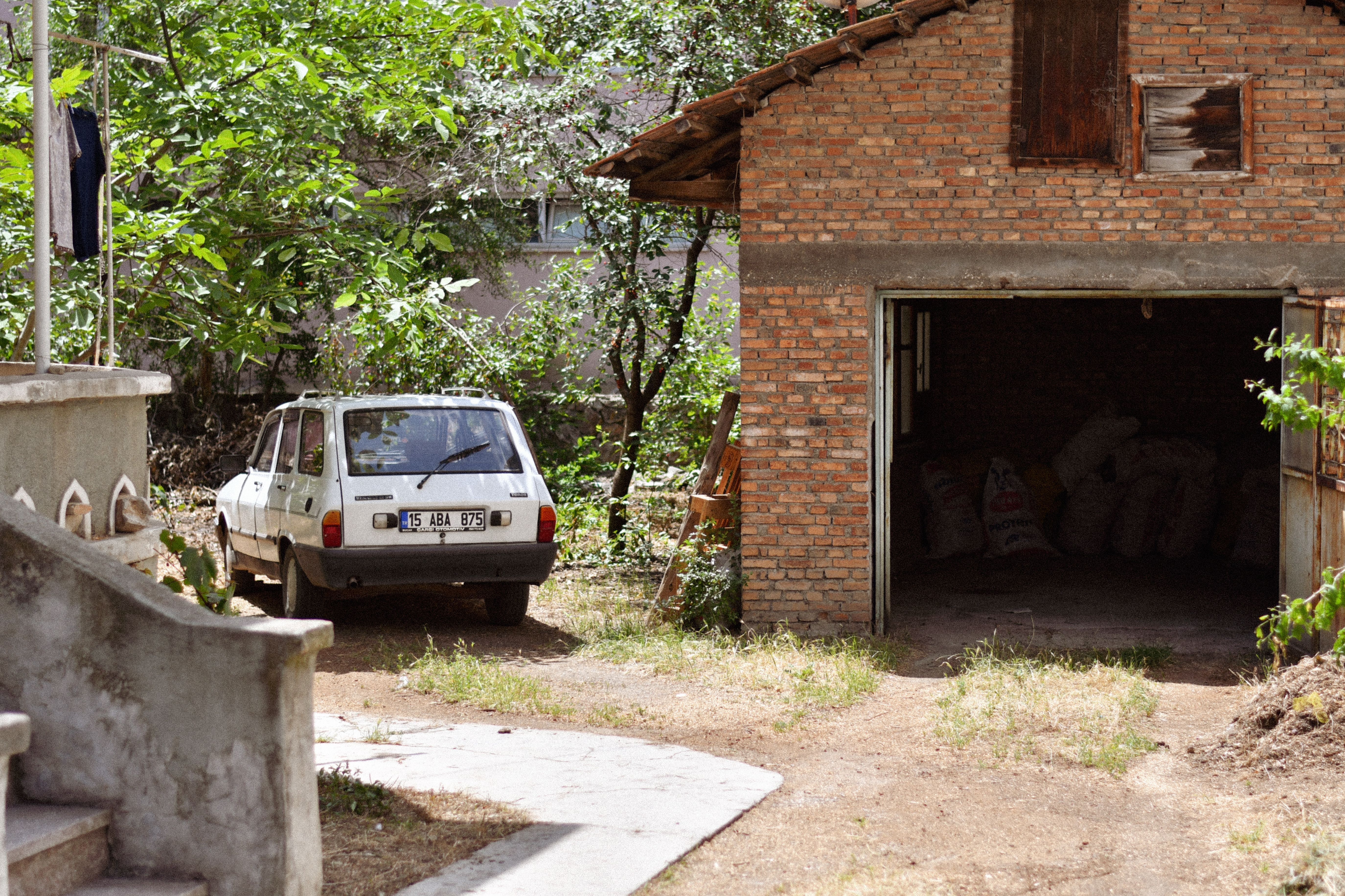 Vintage Car and Building in Village · Free Stock Photo