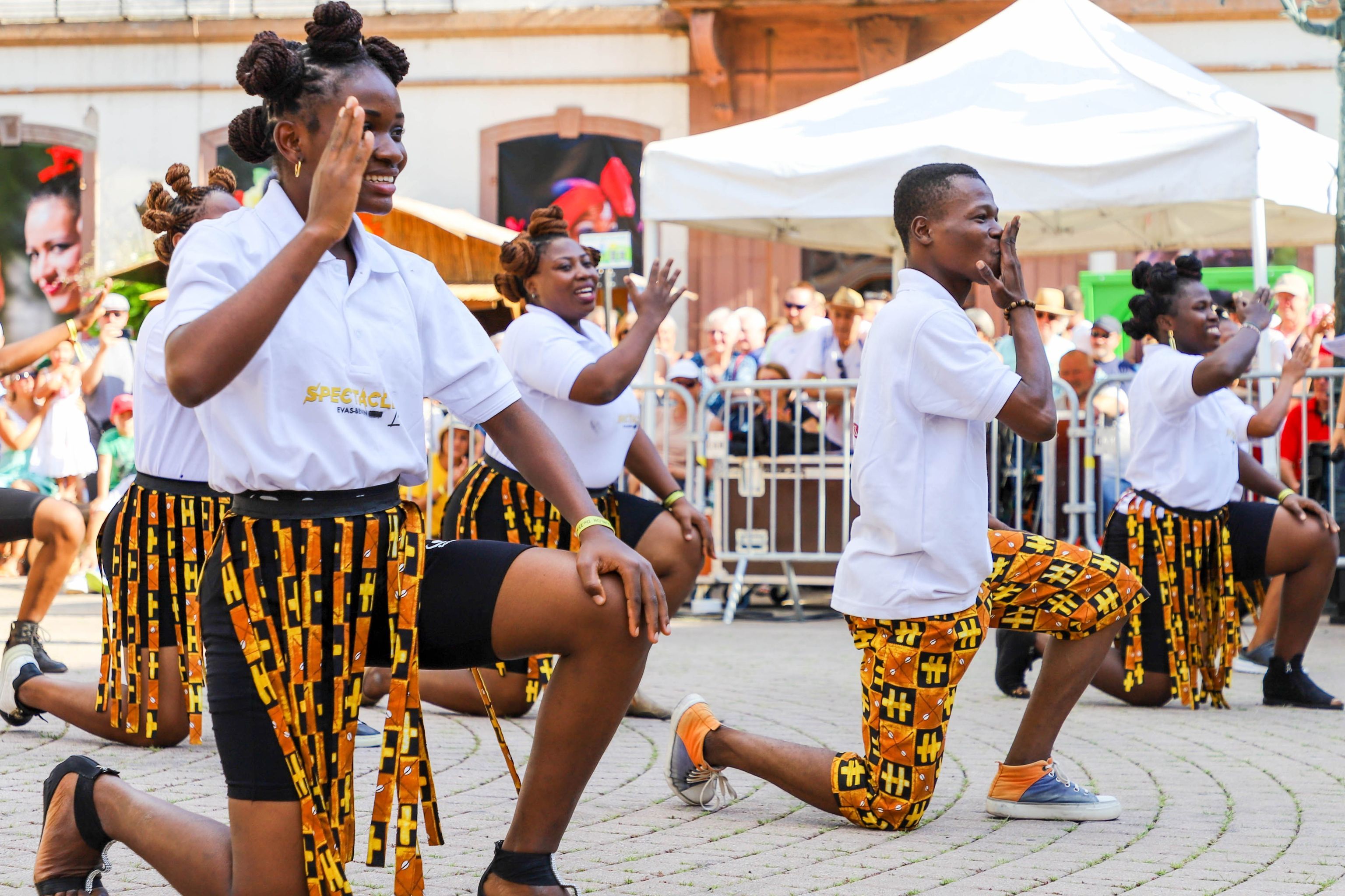 Group of Dancers in Bright Clothes Performing at a Street Festival ...