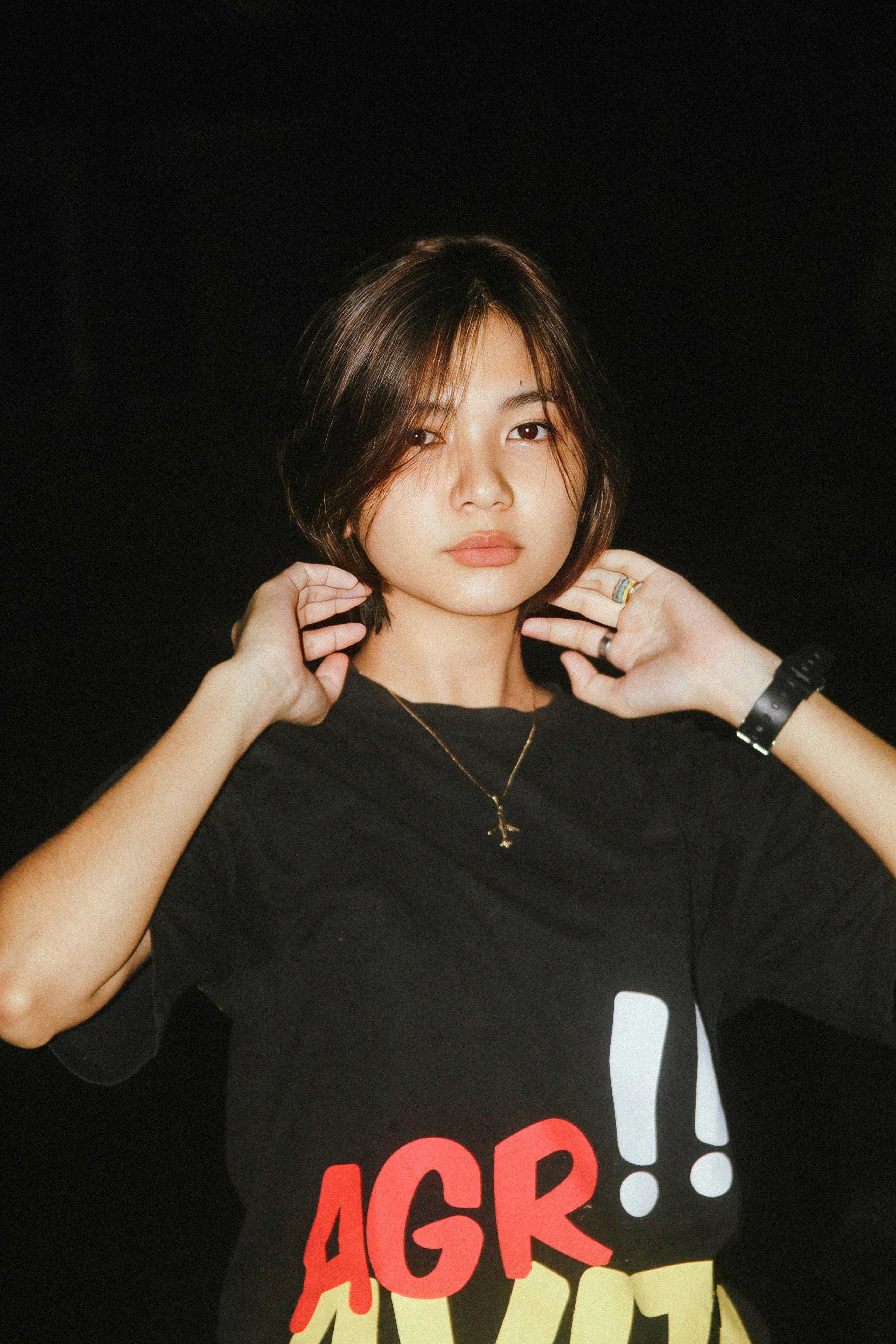 Teenage Girl by the River at Night · Free Stock Photo