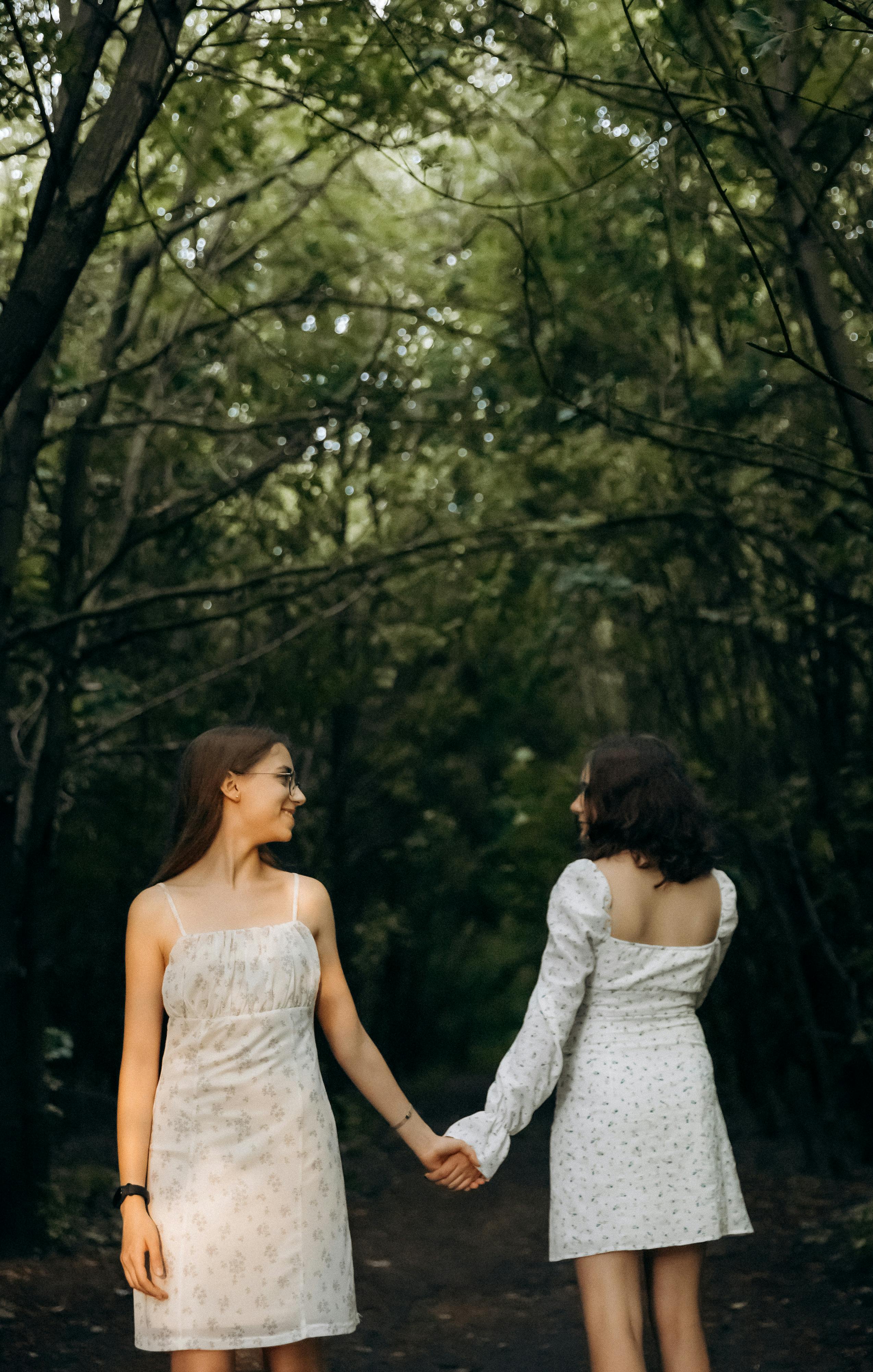 Smiling Couple Holding Hands · Free Stock Photo