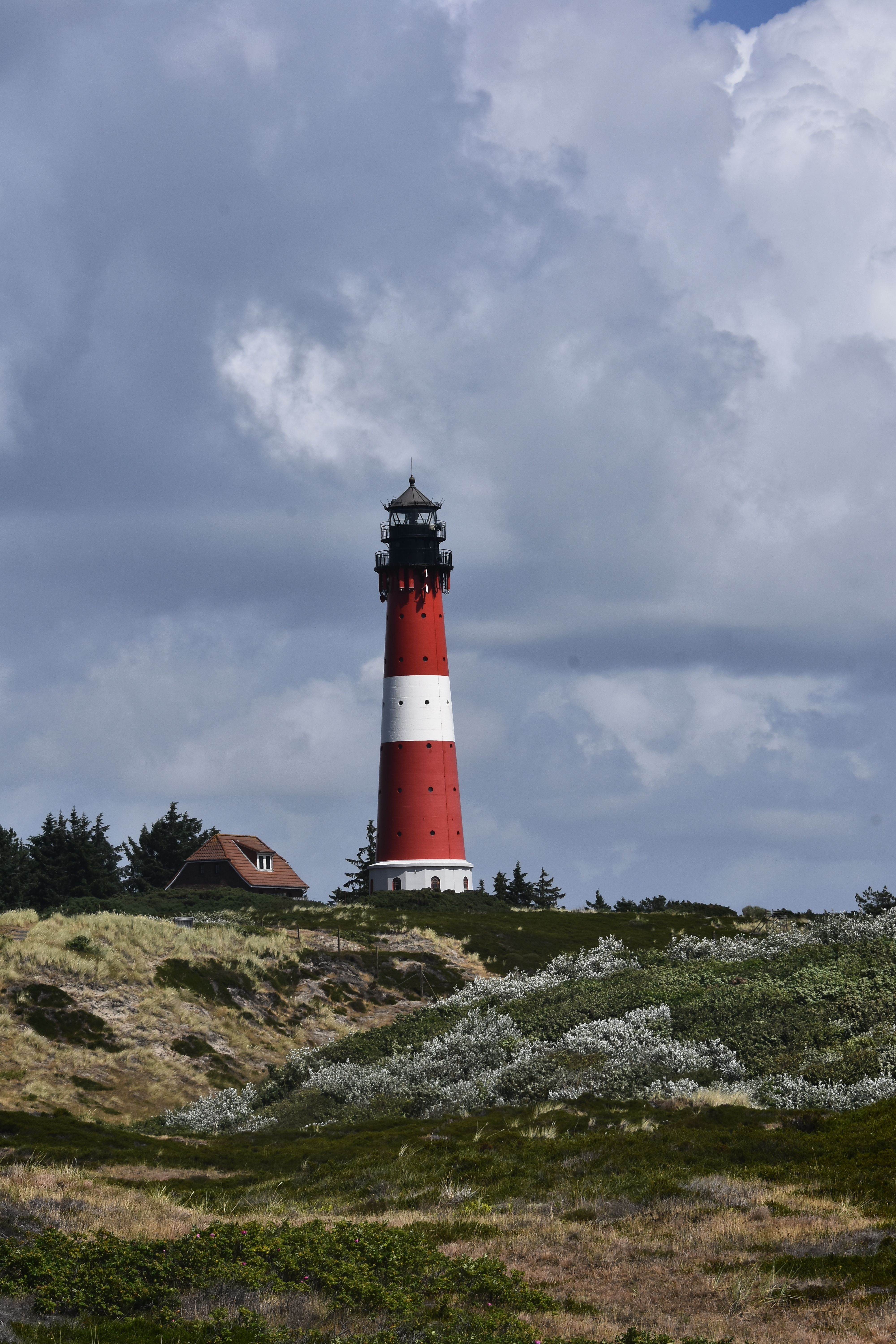 A Lighthouse and a Cottage · Free Stock Photo
