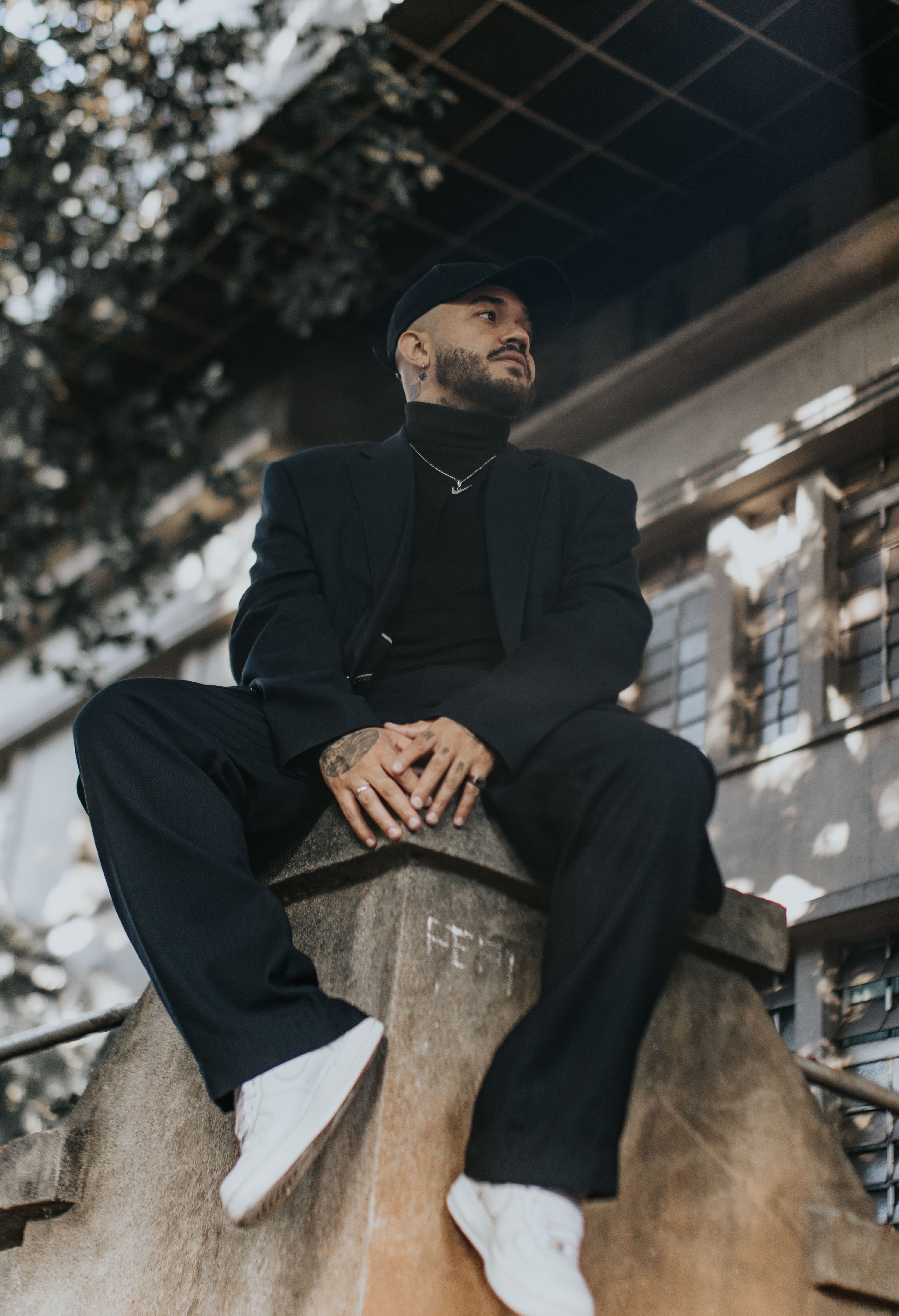 Model in Suit and Cap · Free Stock Photo
