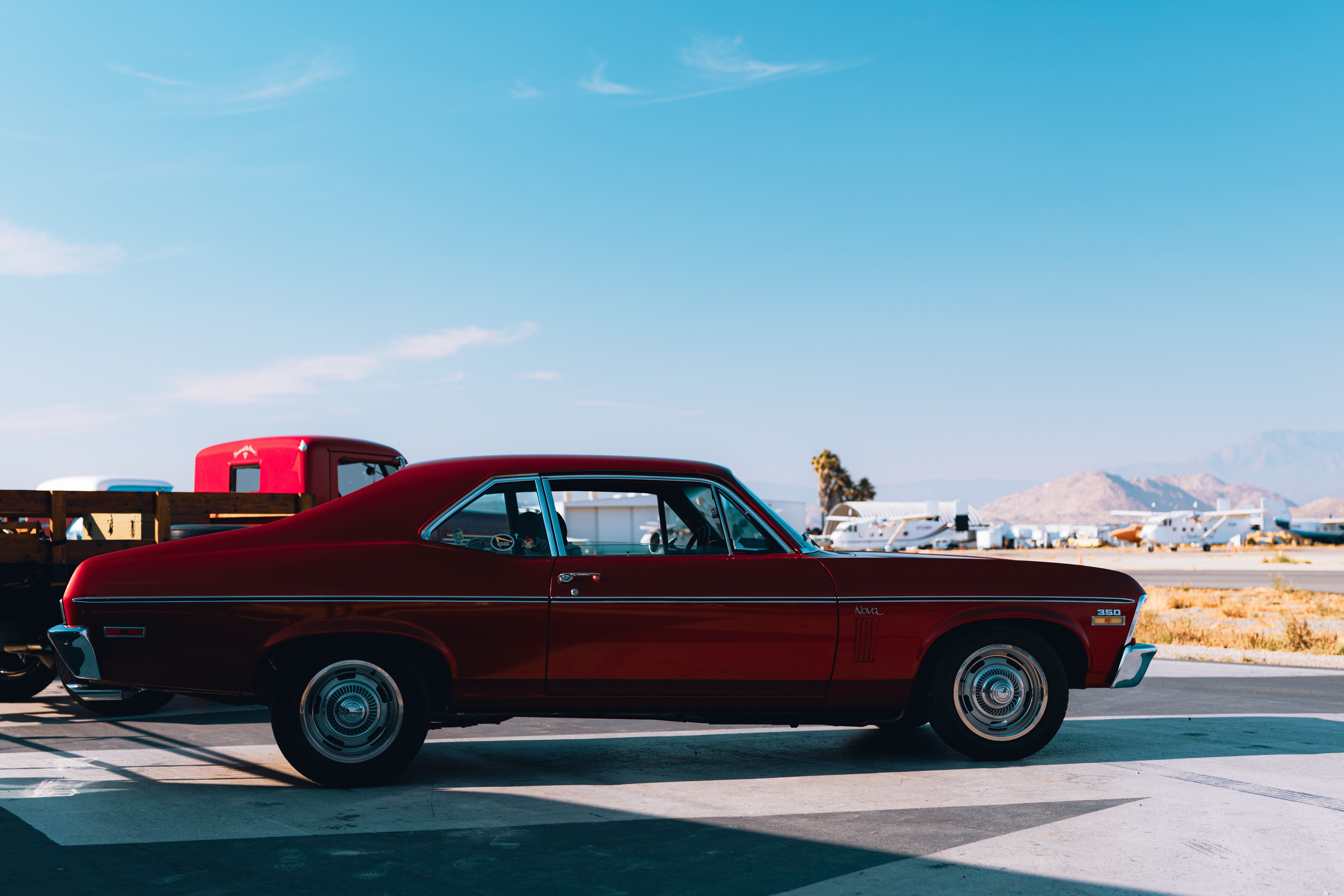 View of a Vintage Chevrolet Nova on a Parking Lot under Blue Sky · Free ...