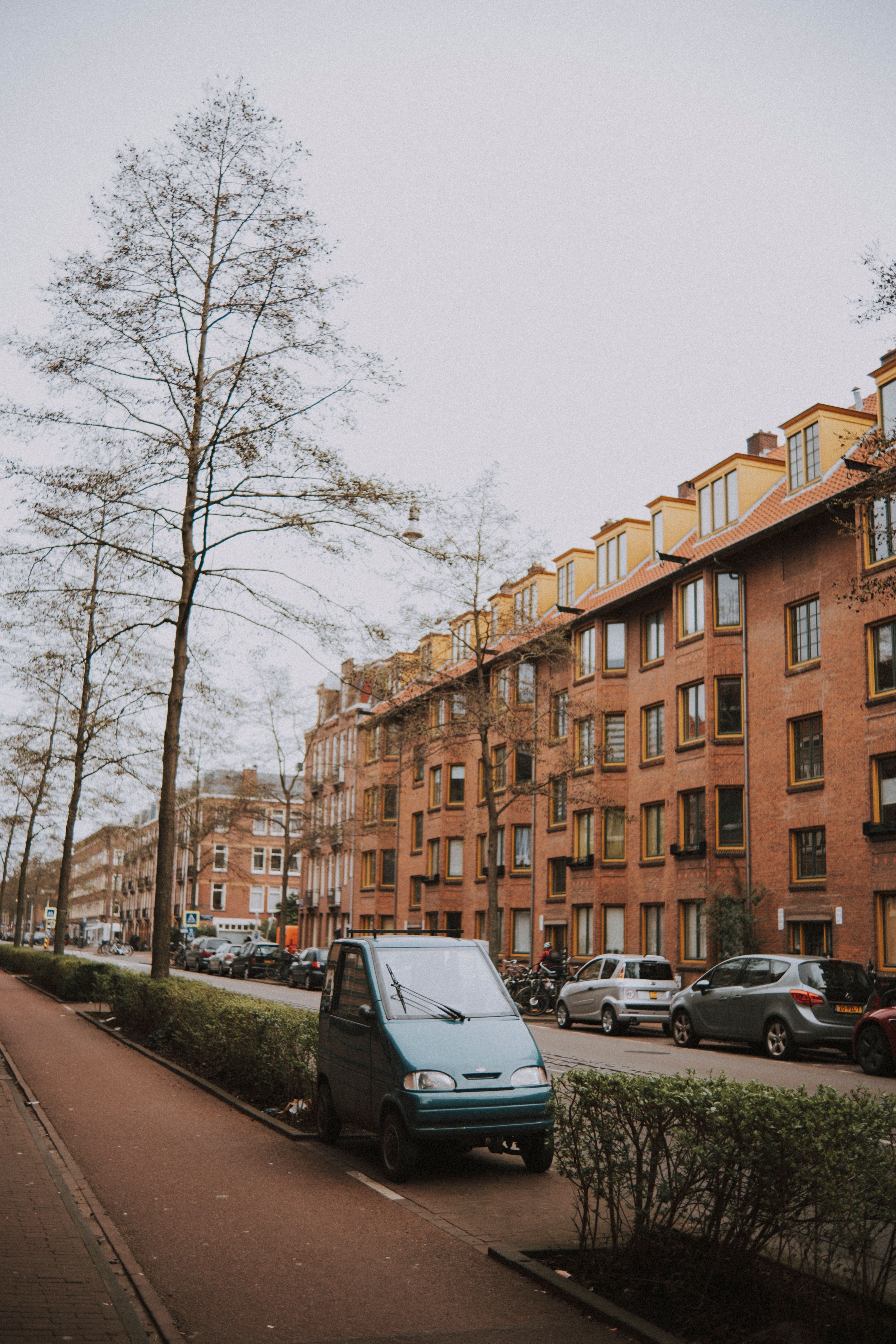 Buildings and Cars around Street in Town · Free Stock Photo