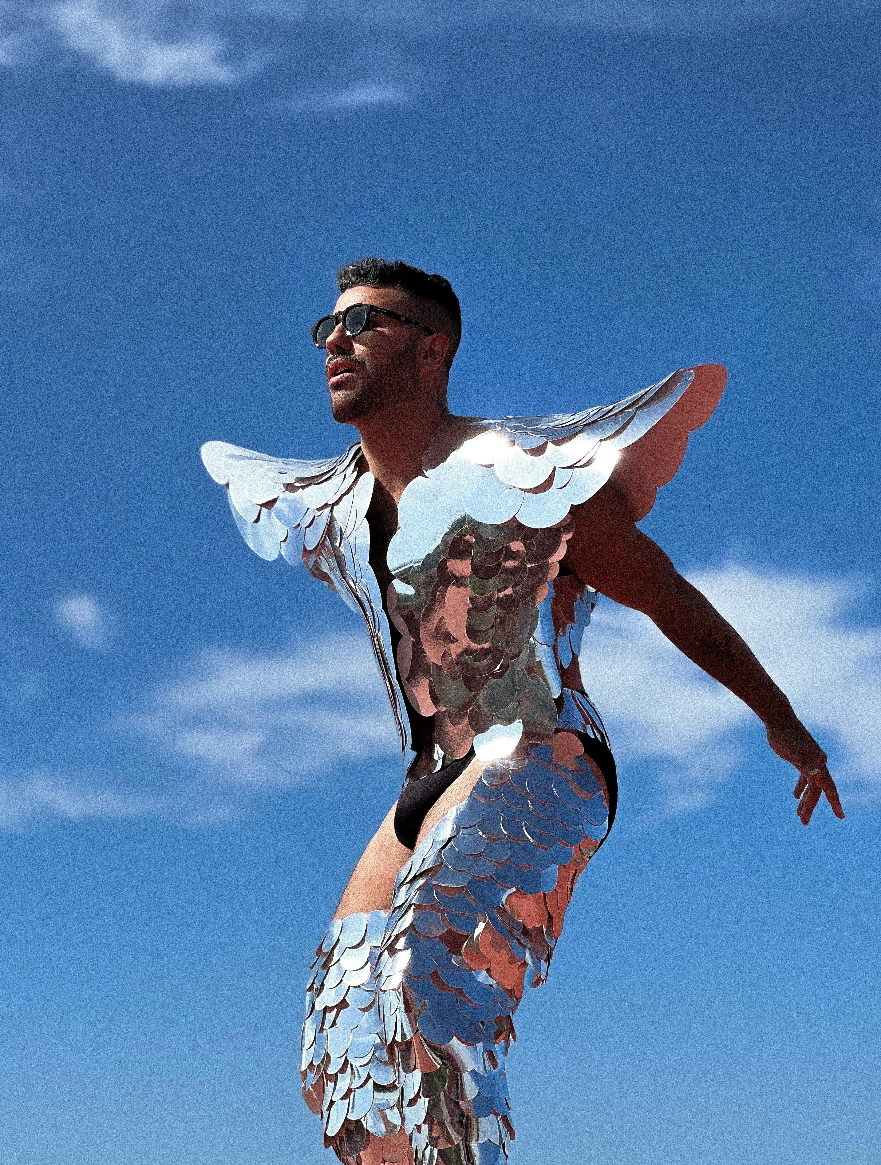 Man in Sunlit, Silver Armor · Free Stock Photo