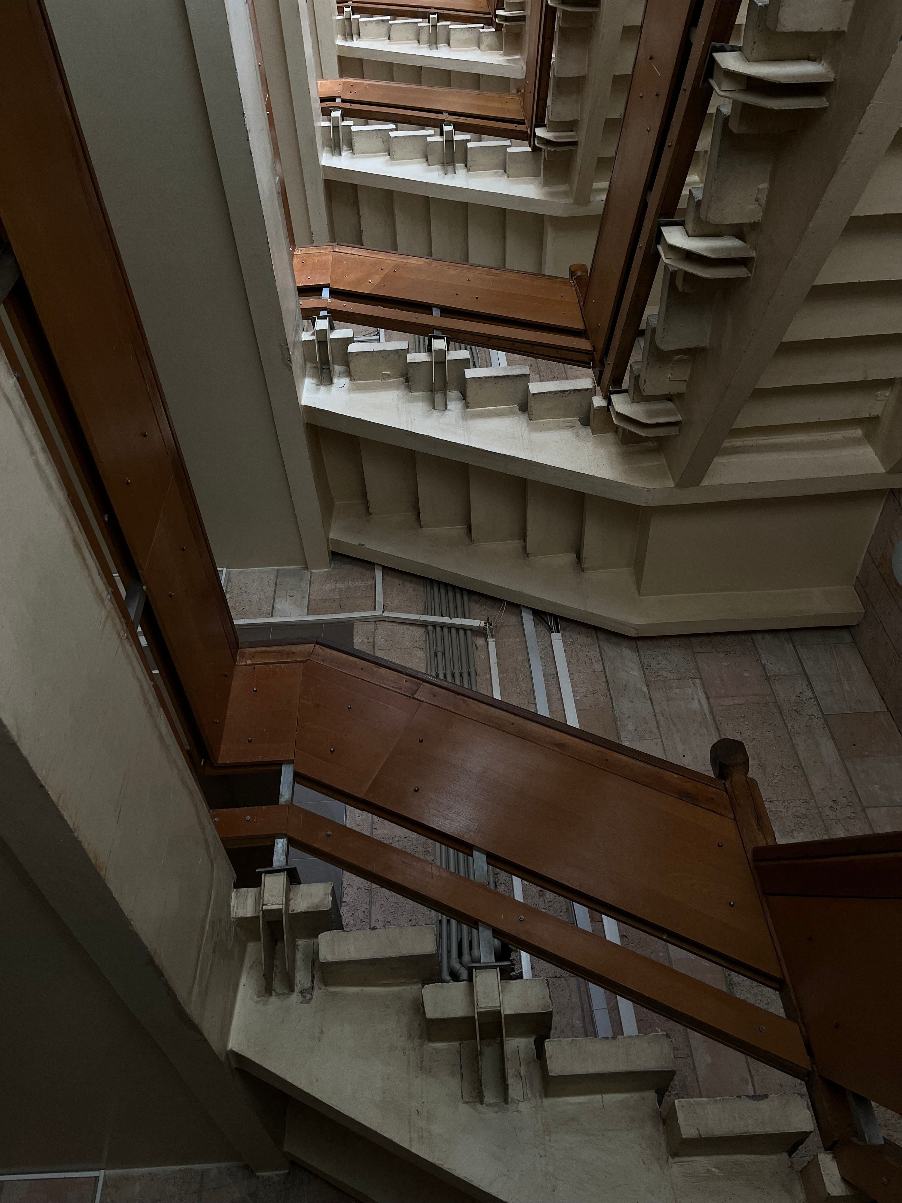 Stairs in form of triangle in house · Free Stock Photo