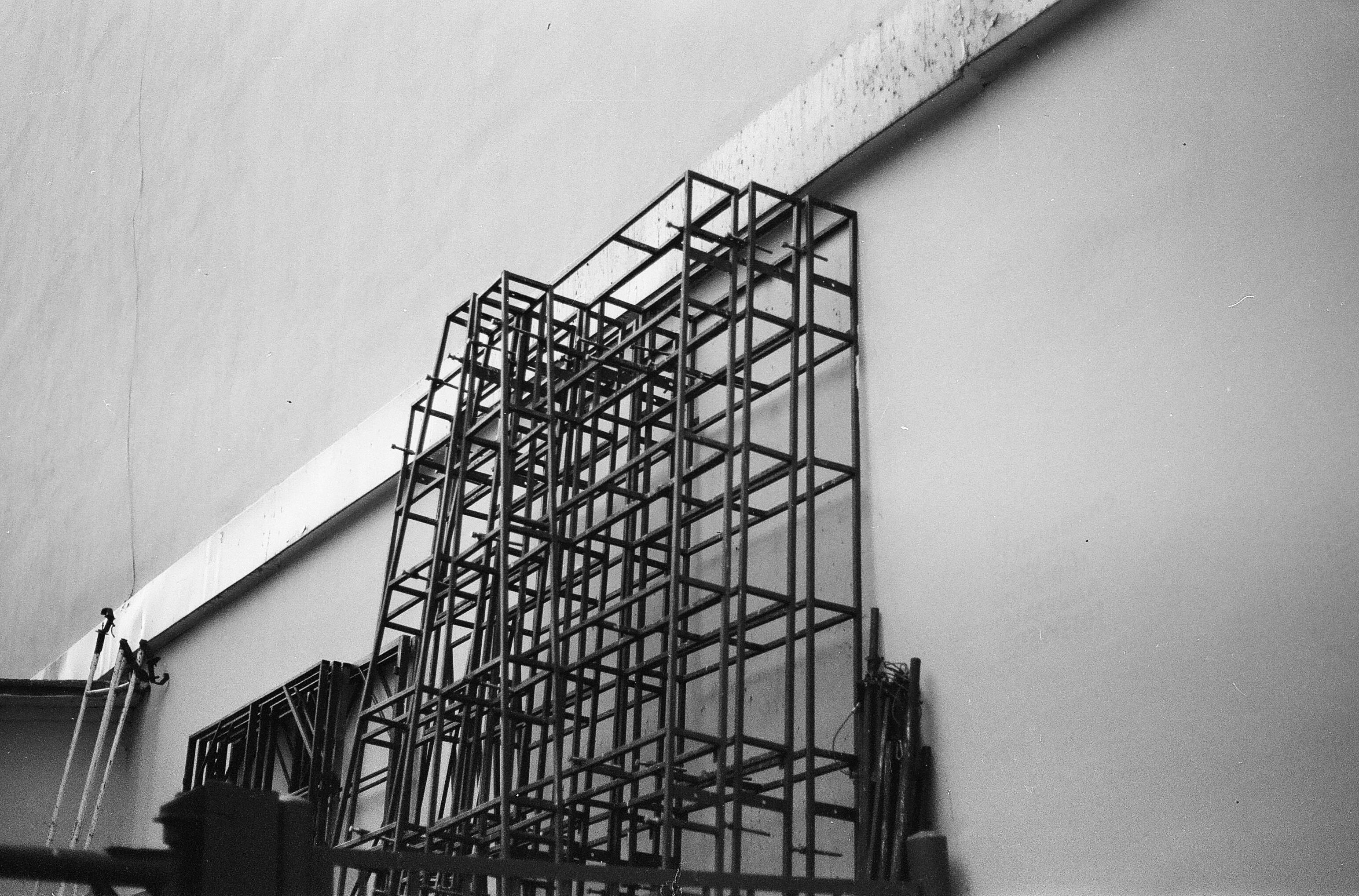 Metal Installation by Wall · Free Stock Photo