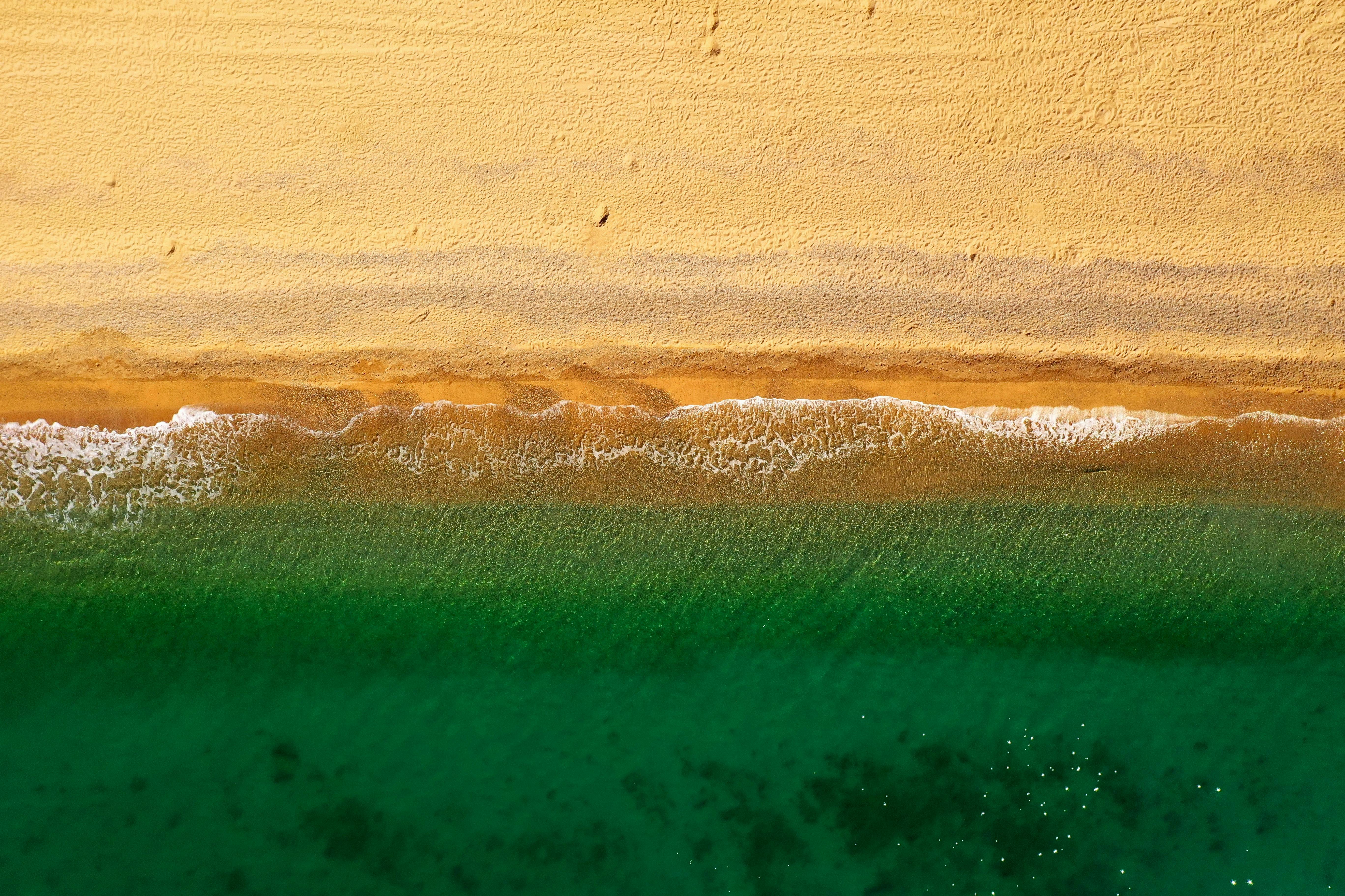 Bird's-eye View of Body of Water and Seashore · Free Stock Photo