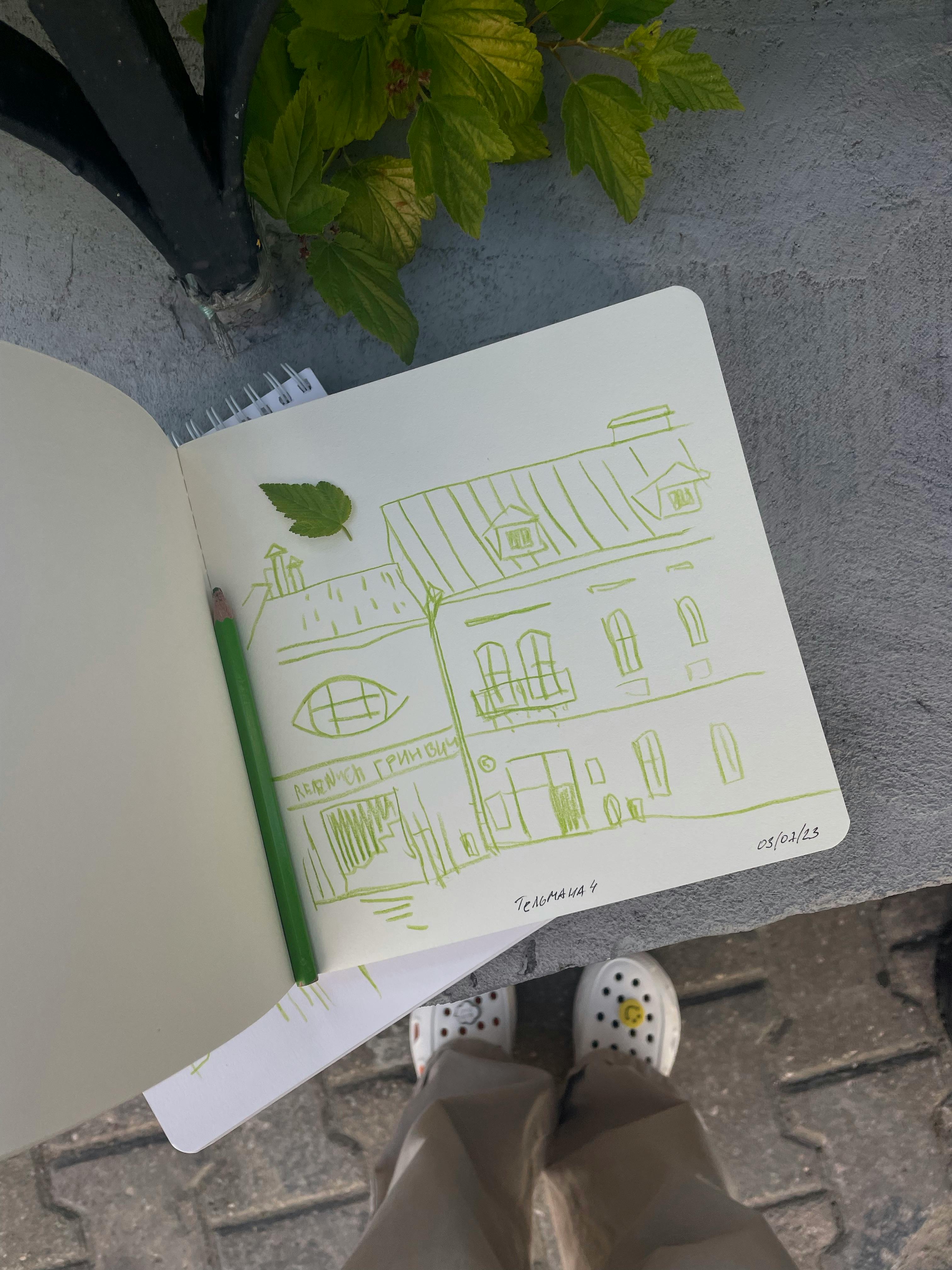 Drawing in Paper Notebook · Free Stock Photo