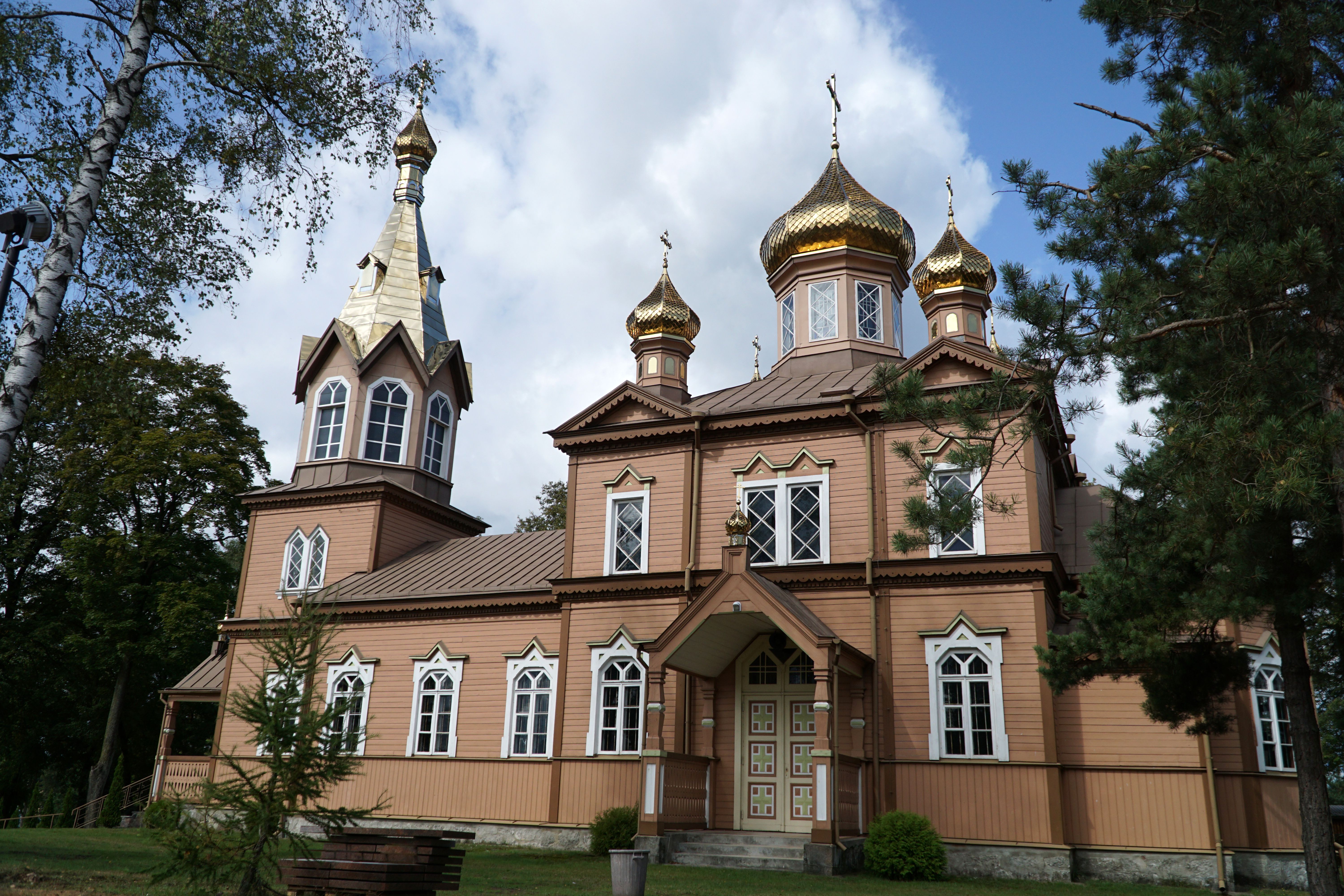 A large church with two gold domes on top · Free Stock Photo