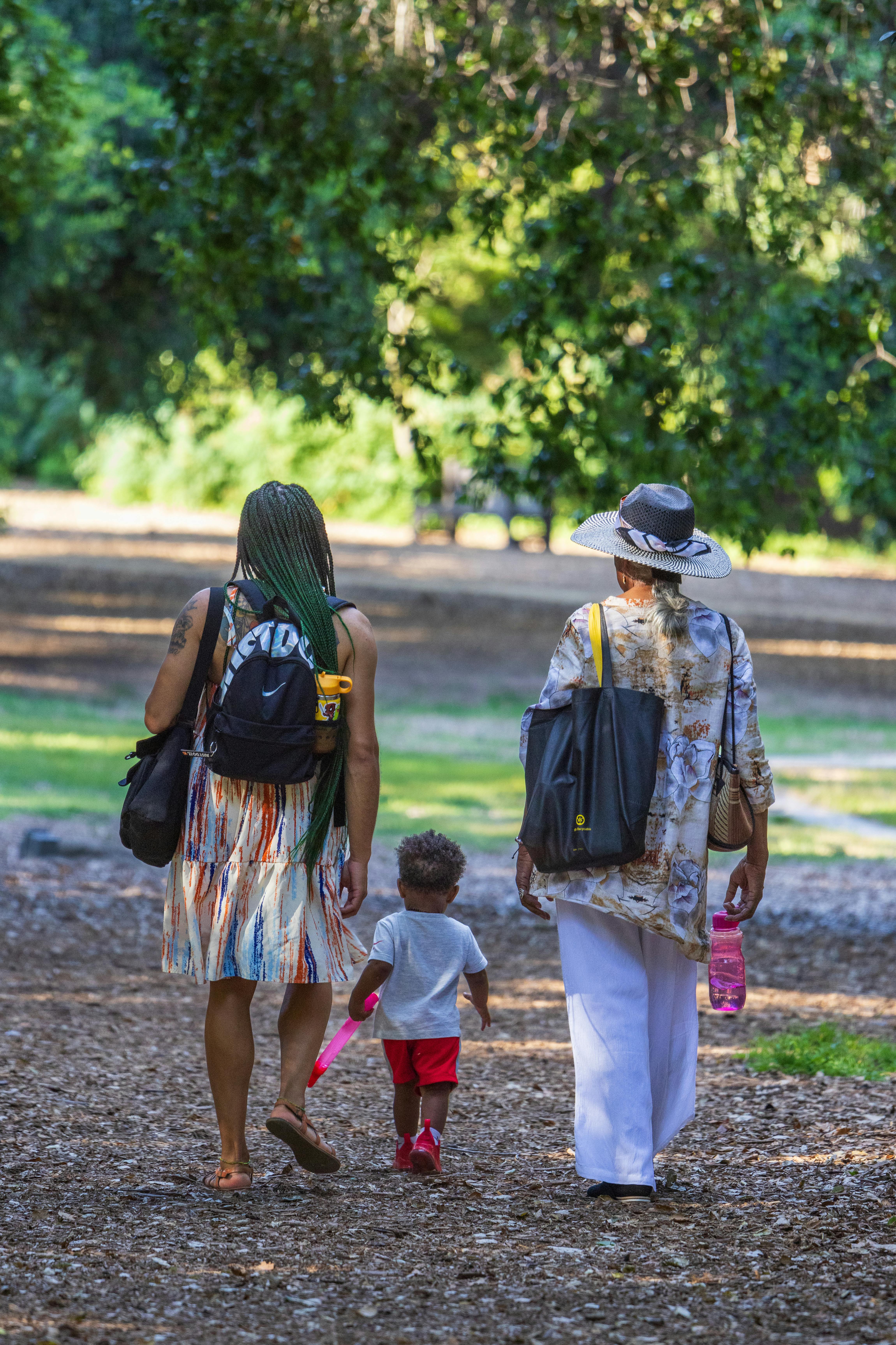Family on Stroll in Park · Free Stock Photo