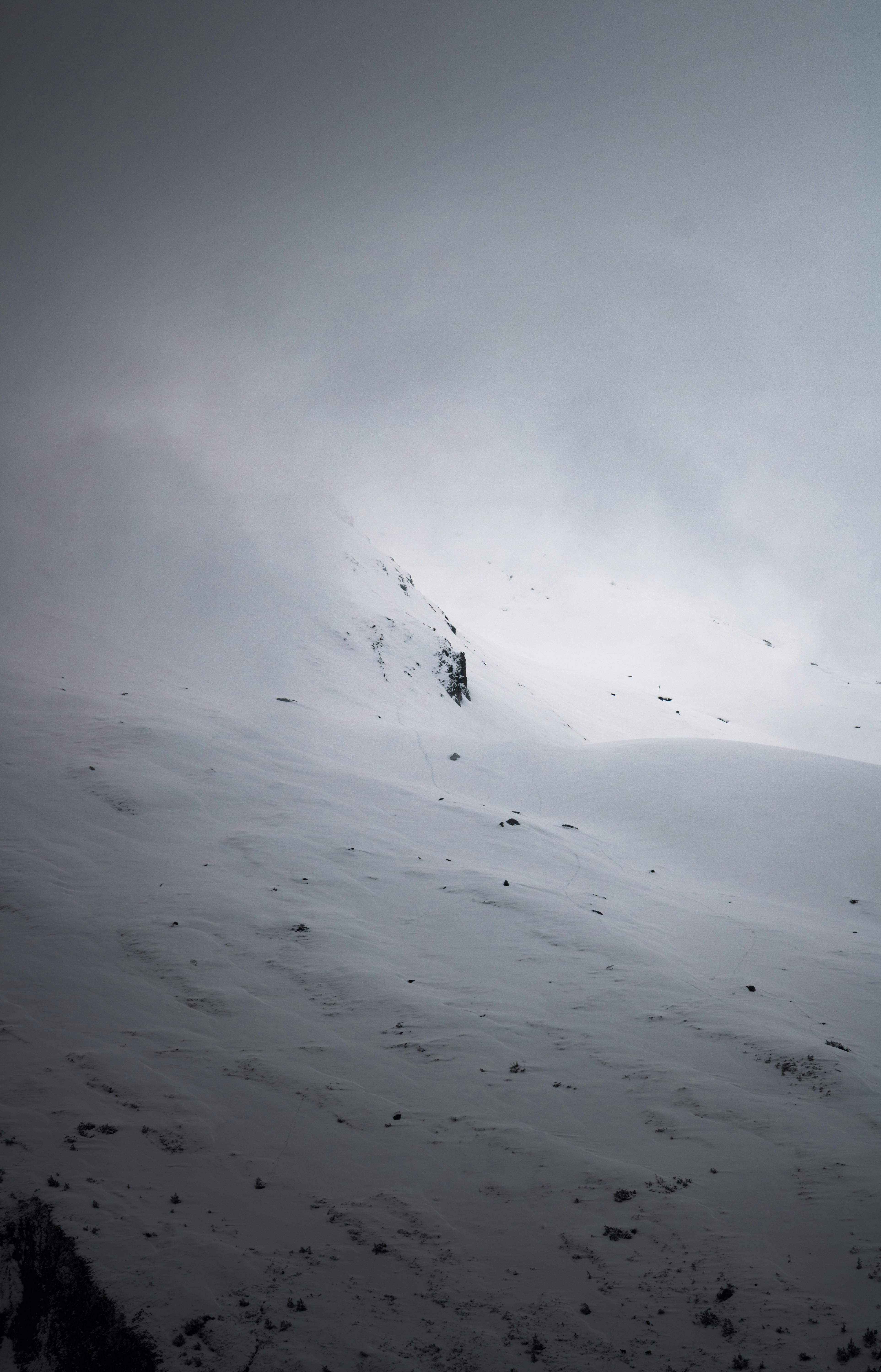 Flying Hot Air Balloon Above Snow Covered Mountain · Free Stock Photo