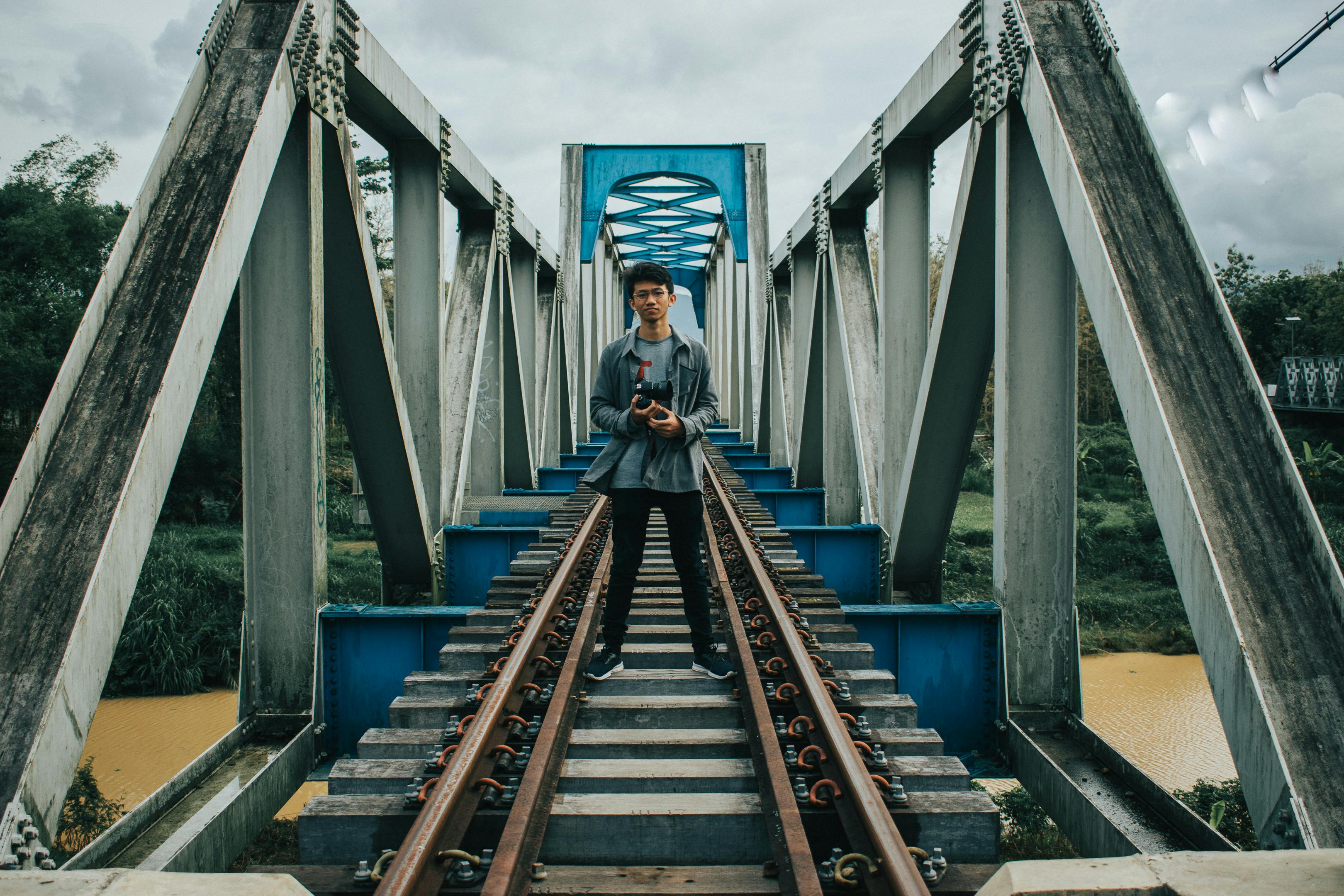 Woman in Blue Denim Jacket, Black Leggings and Black and White Dress ...