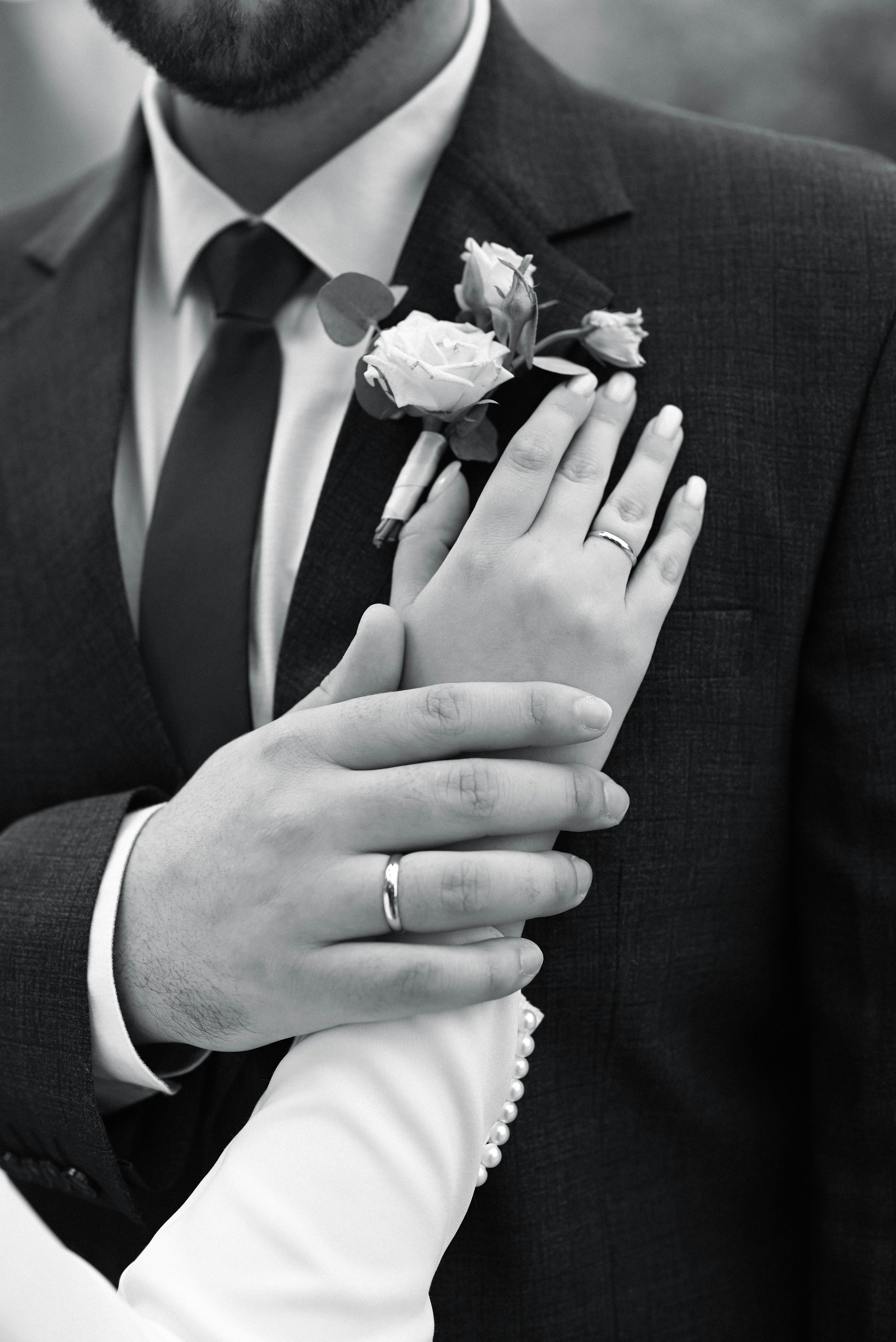 Photo of Hands Holding Rings · Free Stock Photo
