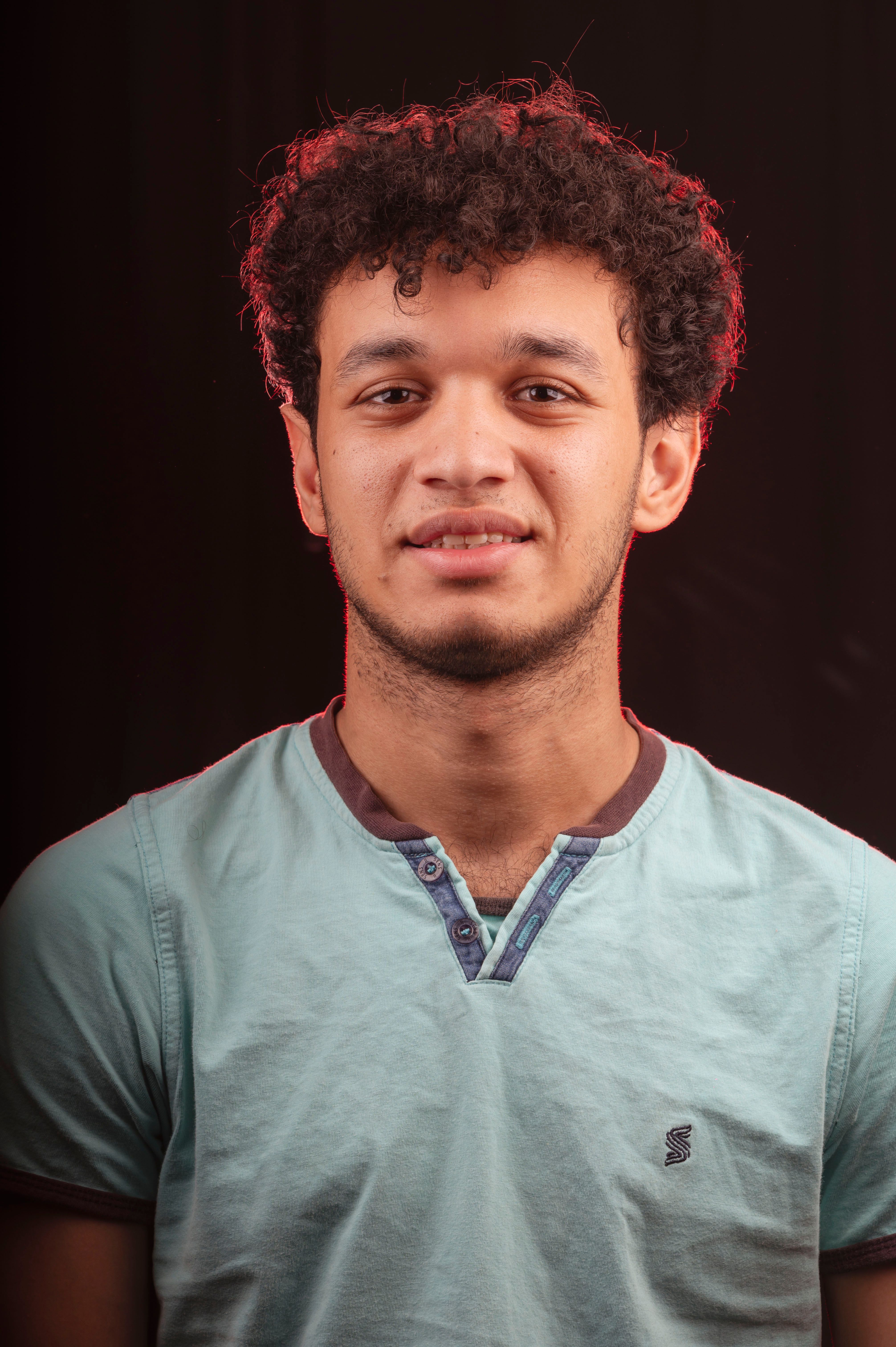 Portrait of a Young Man Smiling · Free Stock Photo