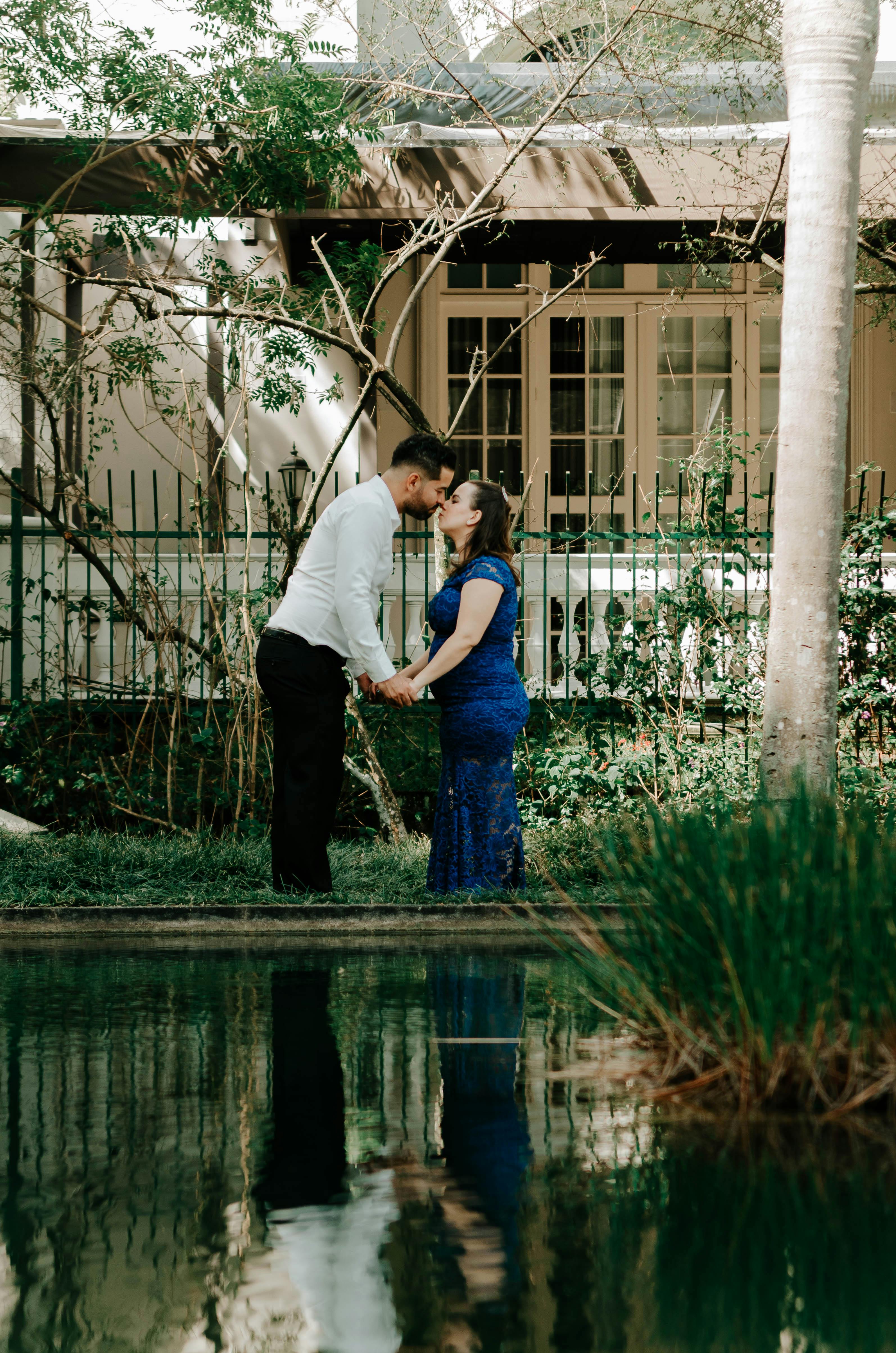 A Couple Kissing in the Garden · Free Stock Photo