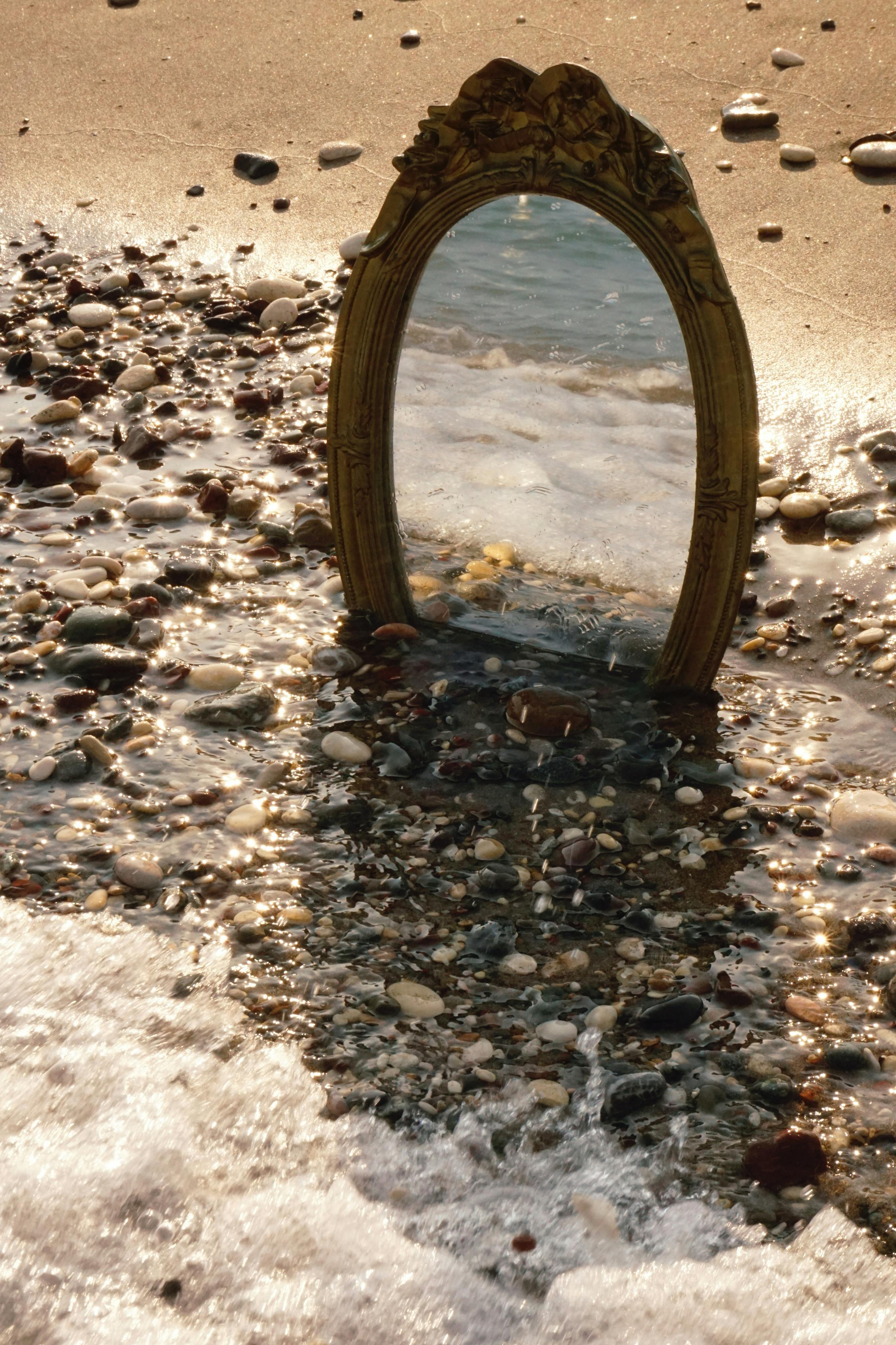 Mirror in Water on Seashore · Free Stock Photo