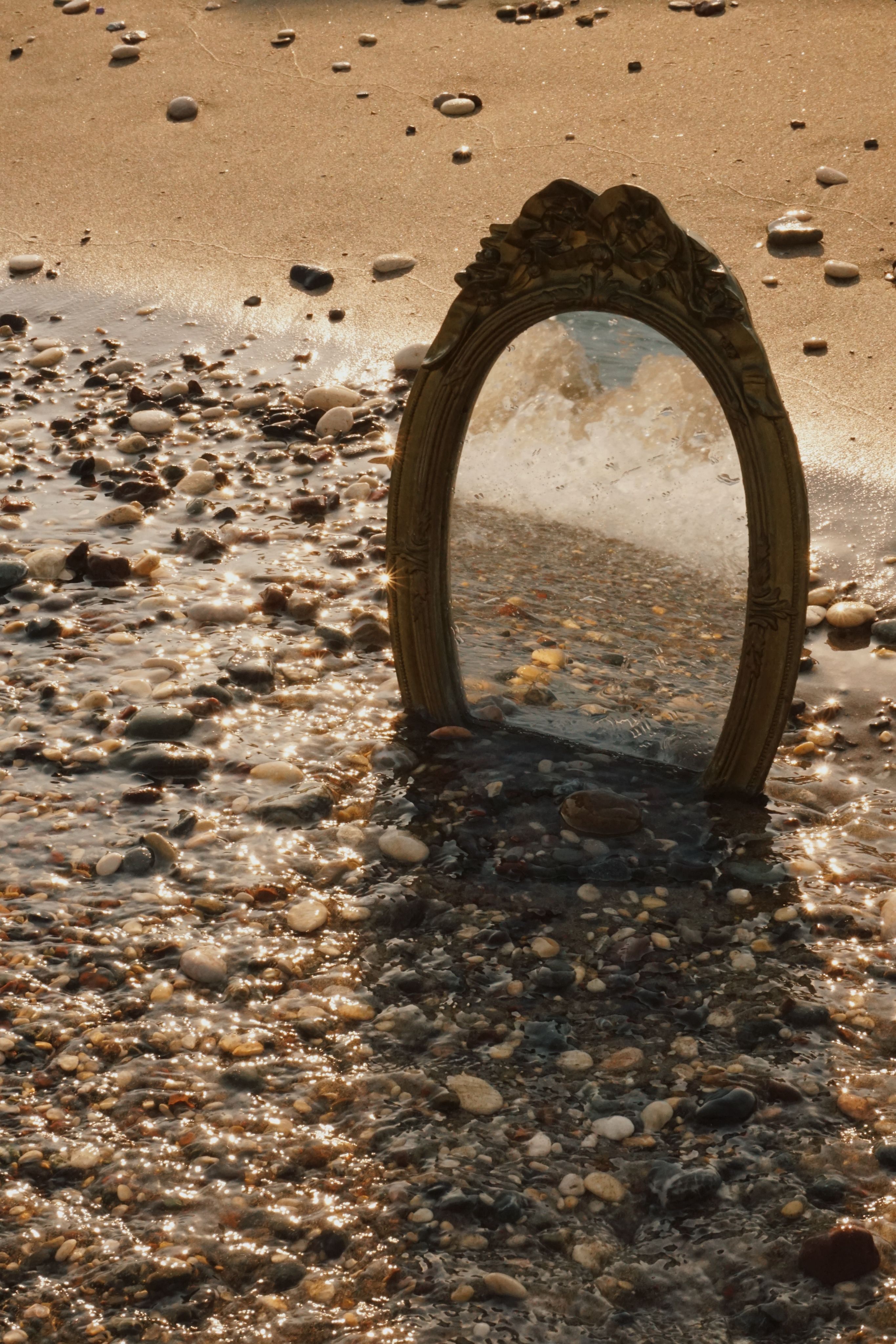 A Mirror with a Vintage Frame in the Sea · Free Stock Photo