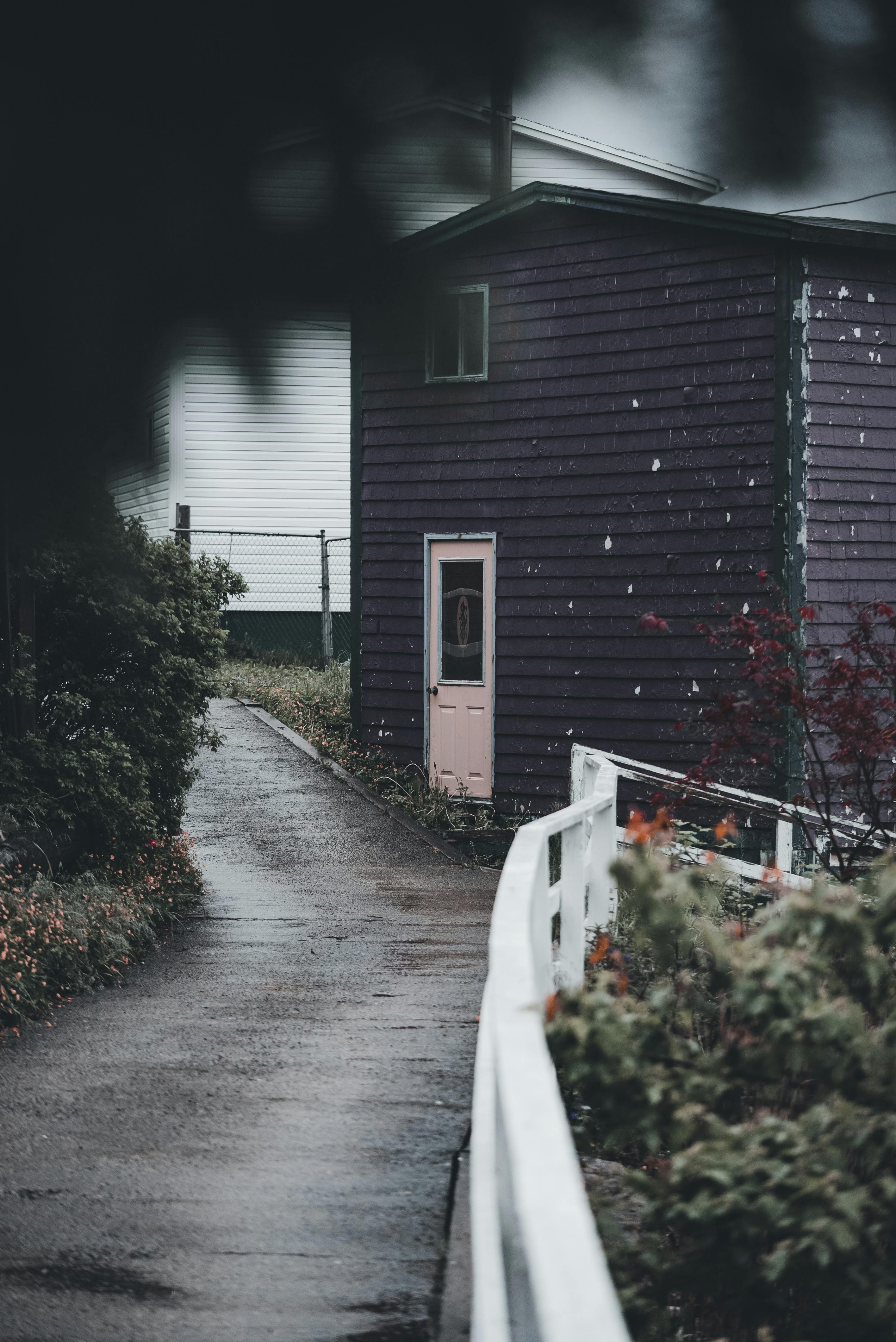 Empty Road Between Houses · Free Stock Photo