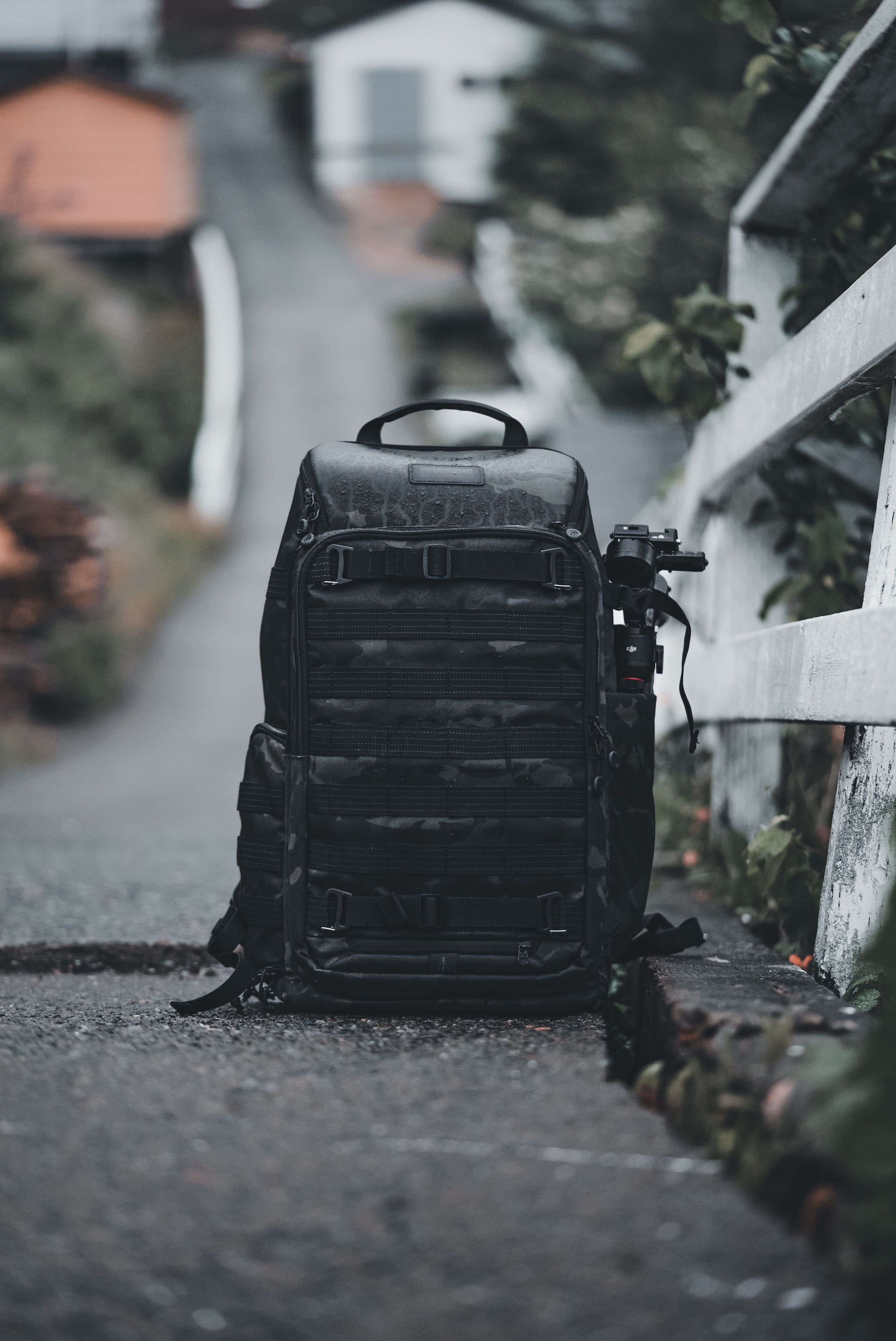 Wet Backpack on Street · Free Stock Photo