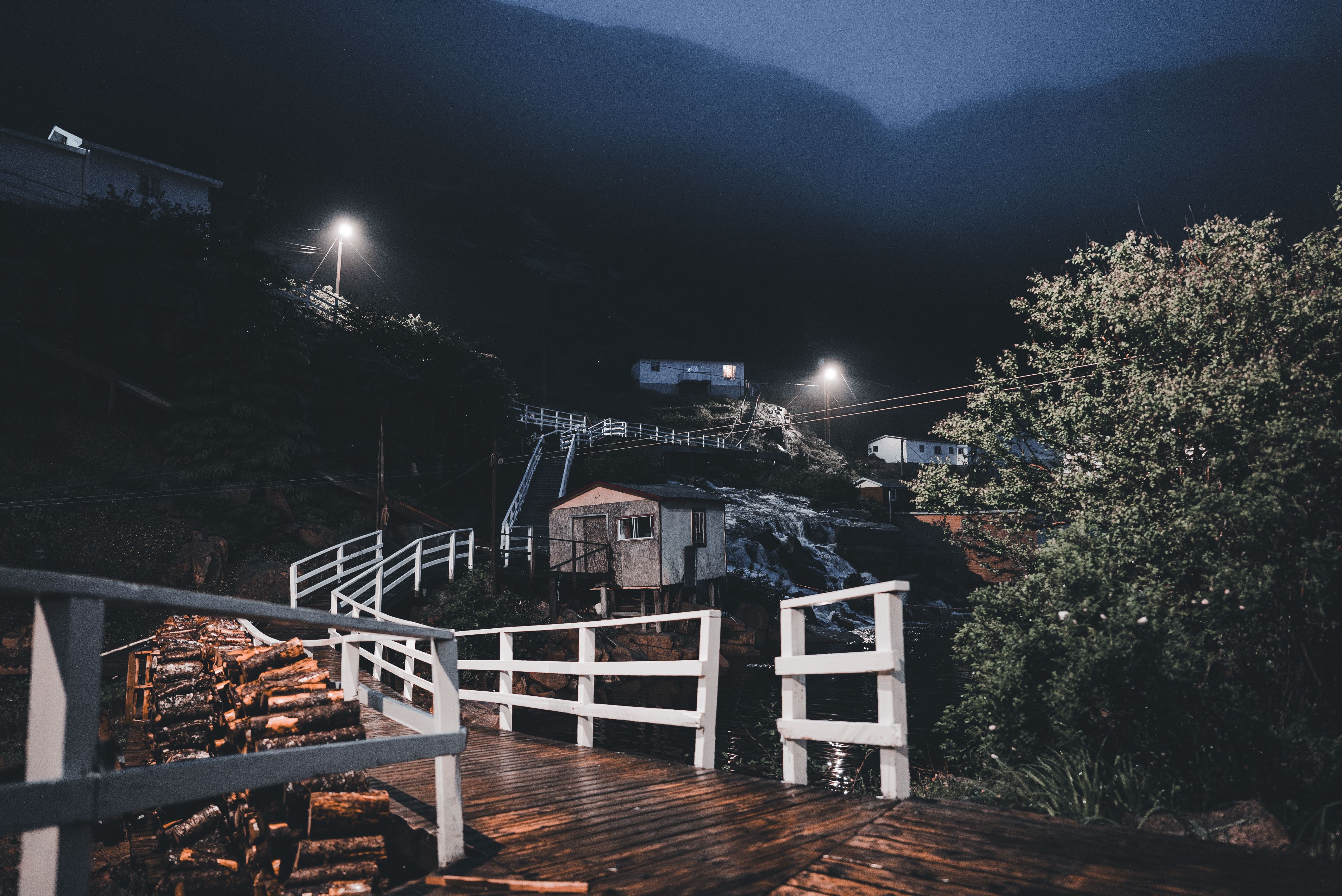 Wet Wooden Walkway of Fishing Village at Night · Free Stock Photo