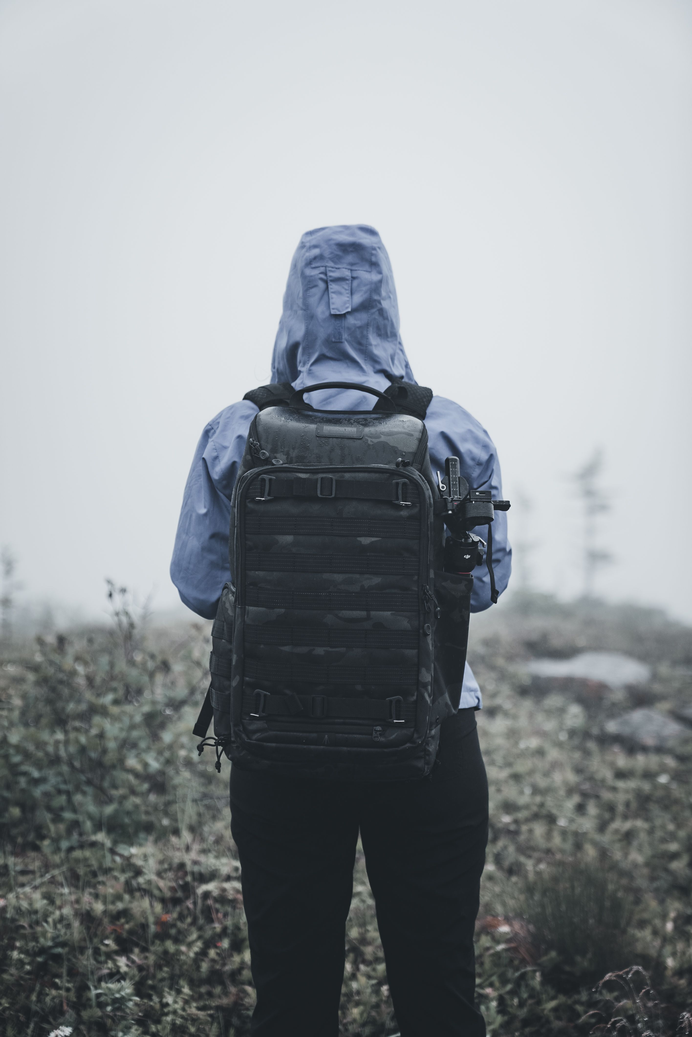 Person in Jacket with Hood and Backpack · Free Stock Photo