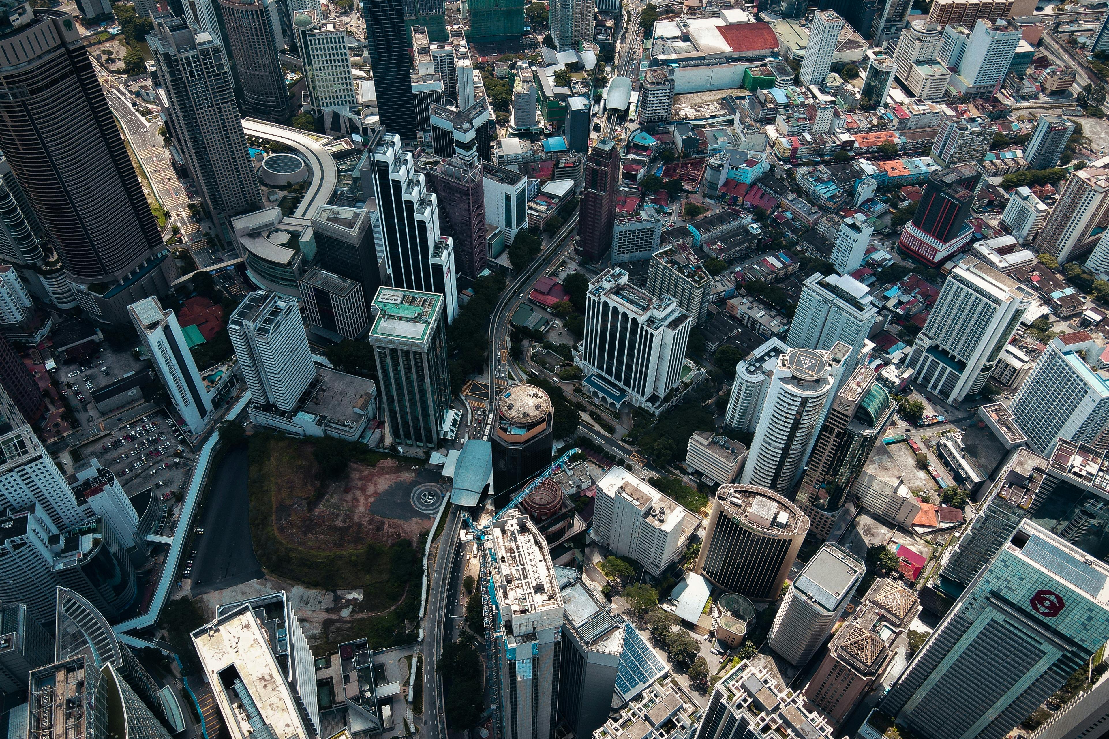 Drone Shot of Buildings and Skyscrapers in City · Free Stock Photo