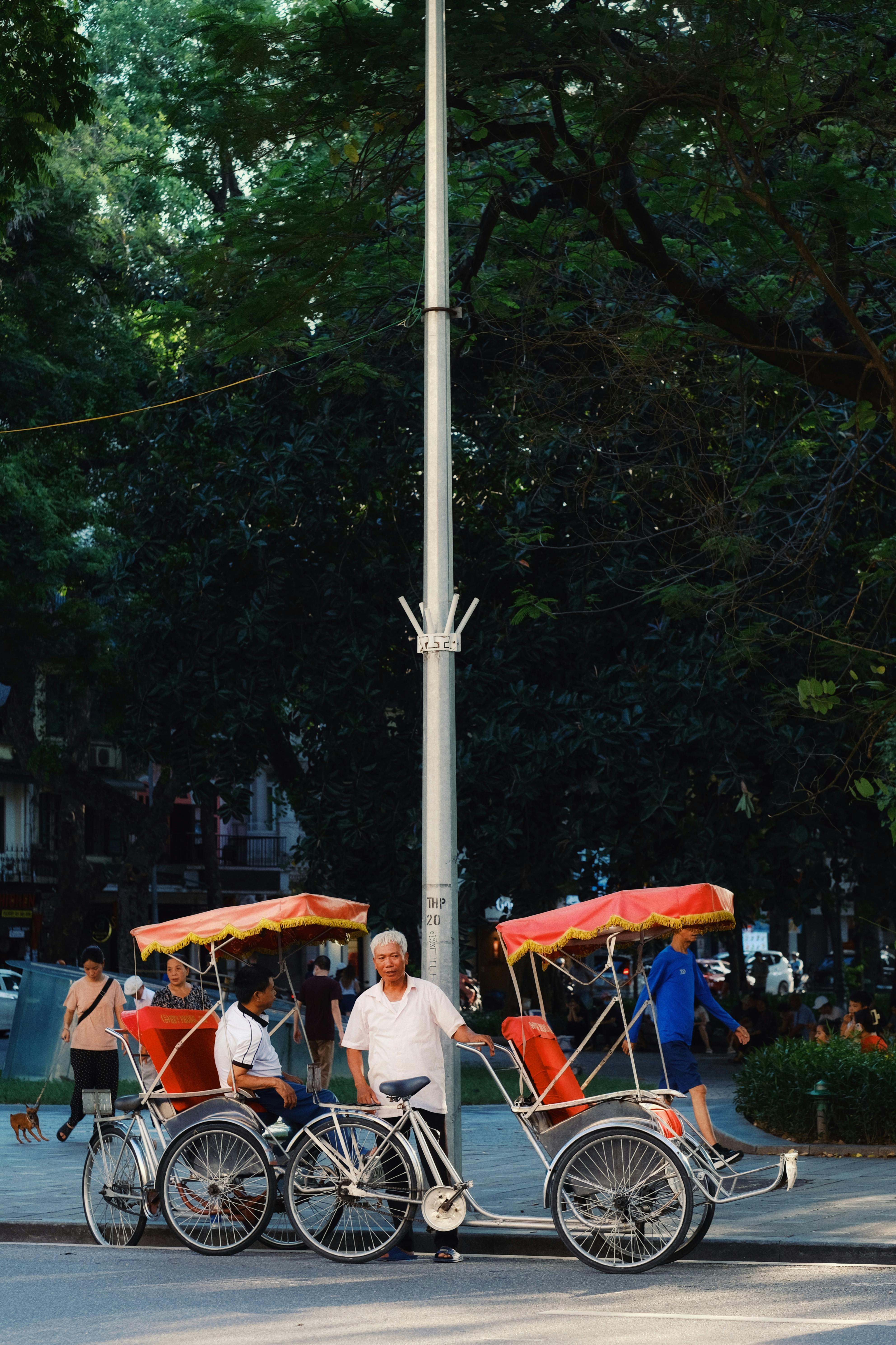Photo of Men Waiting with Rickshaws · Free Stock Photo