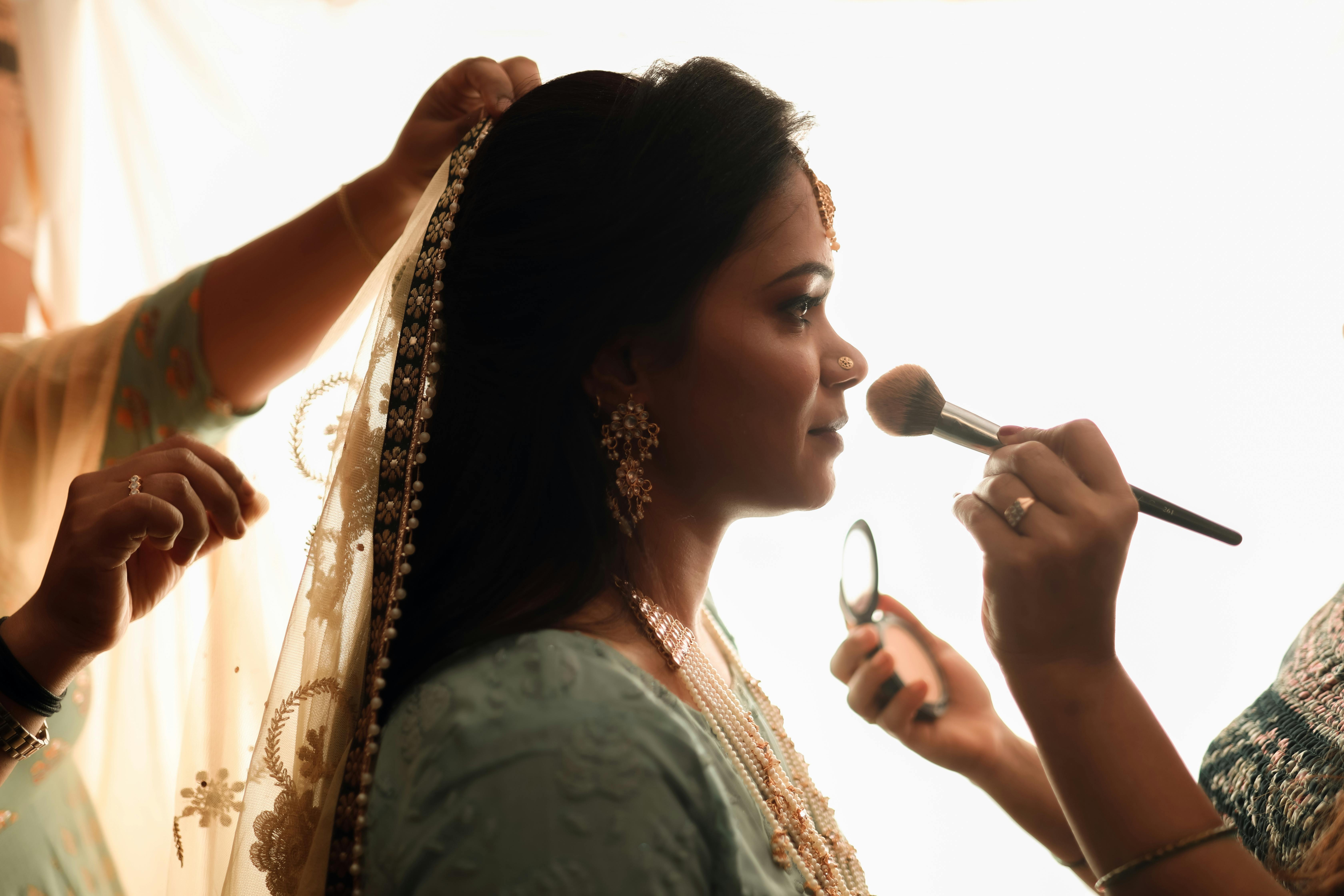Bride Getting Her Makeup Done for the Wedding · Free Stock Photo
