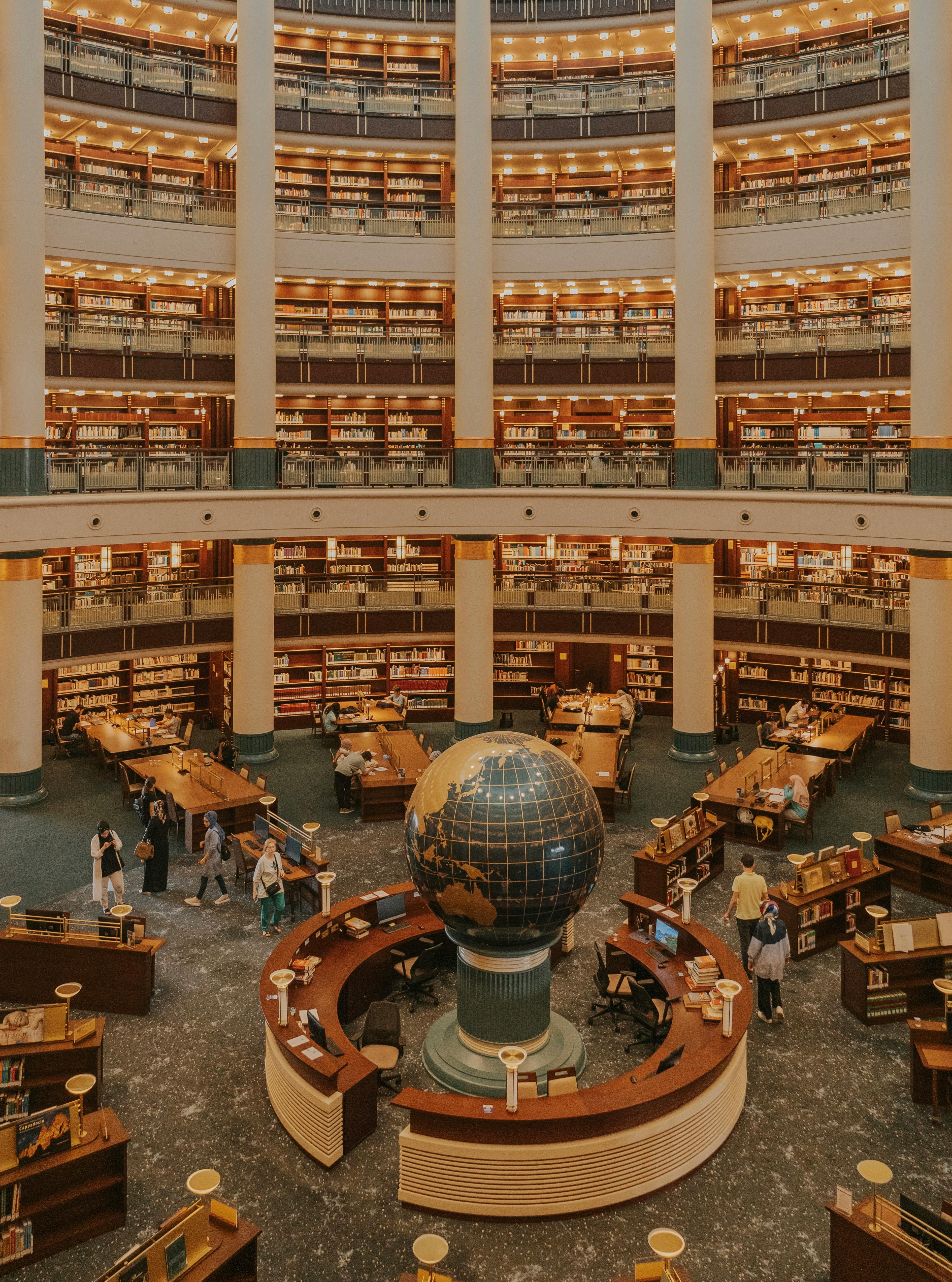 Globe in a Library · Free Stock Photo
