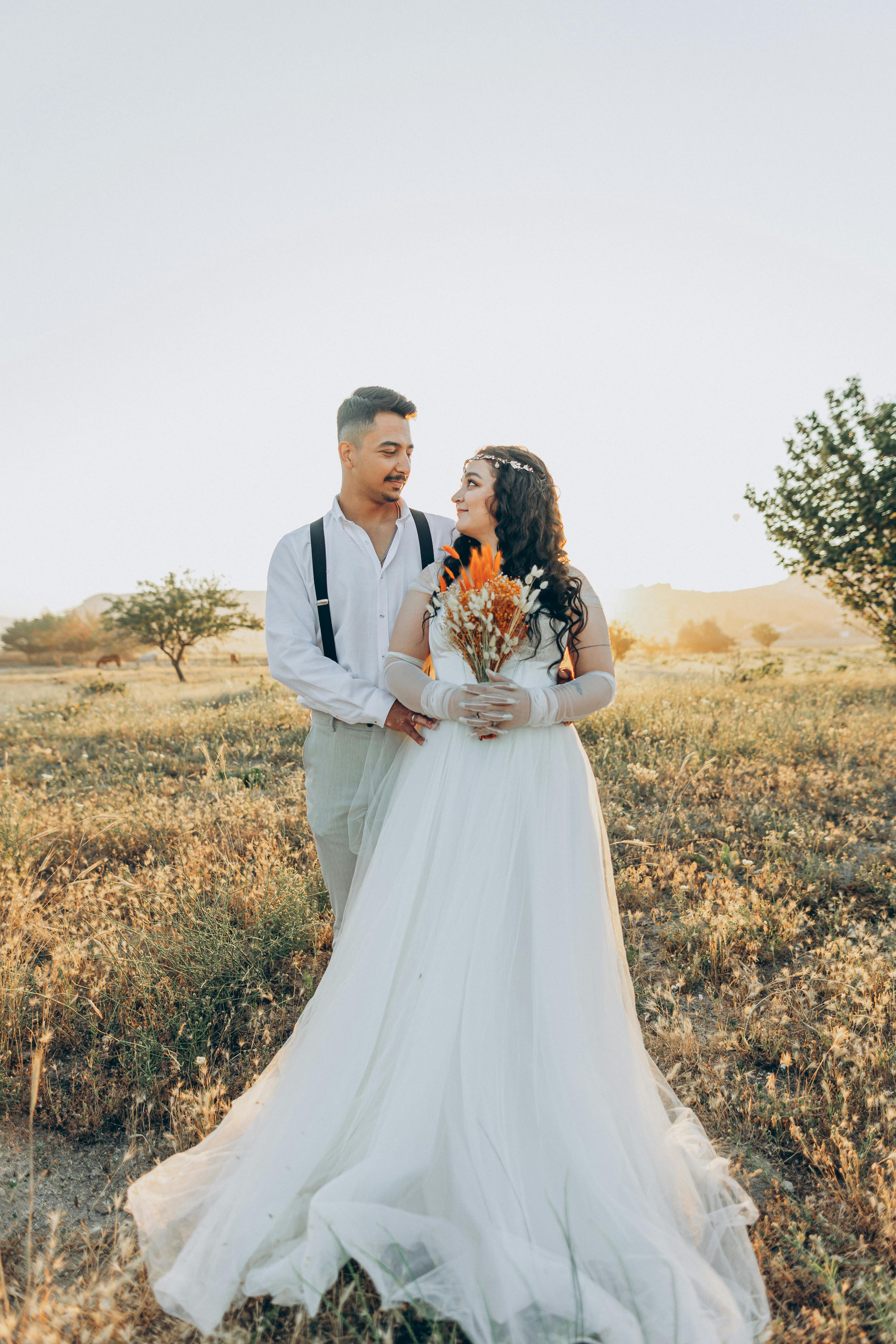 Newlyweds Standing Side by Side · Free Stock Photo
