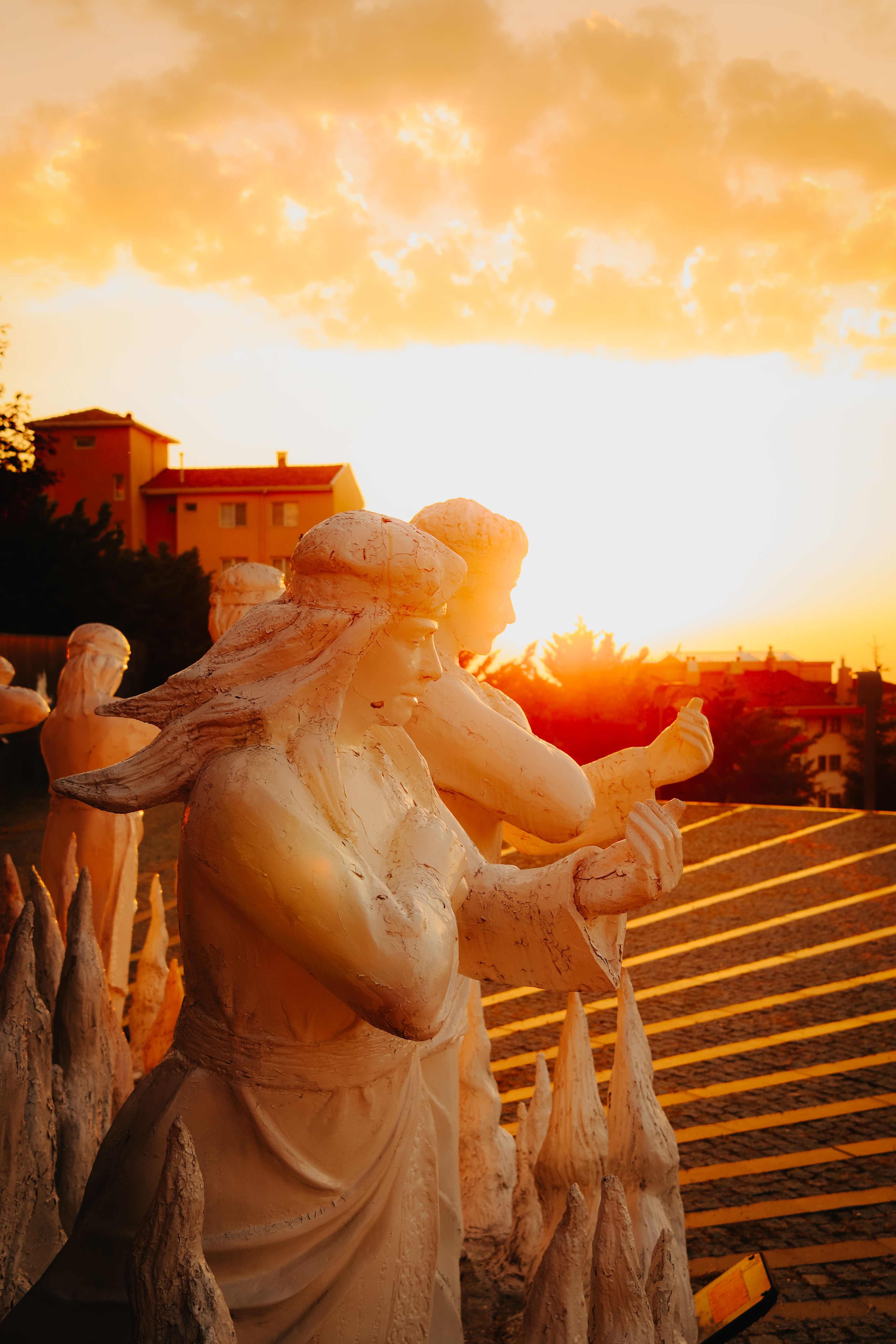 Marble Statues at Sunset · Free Stock Photo