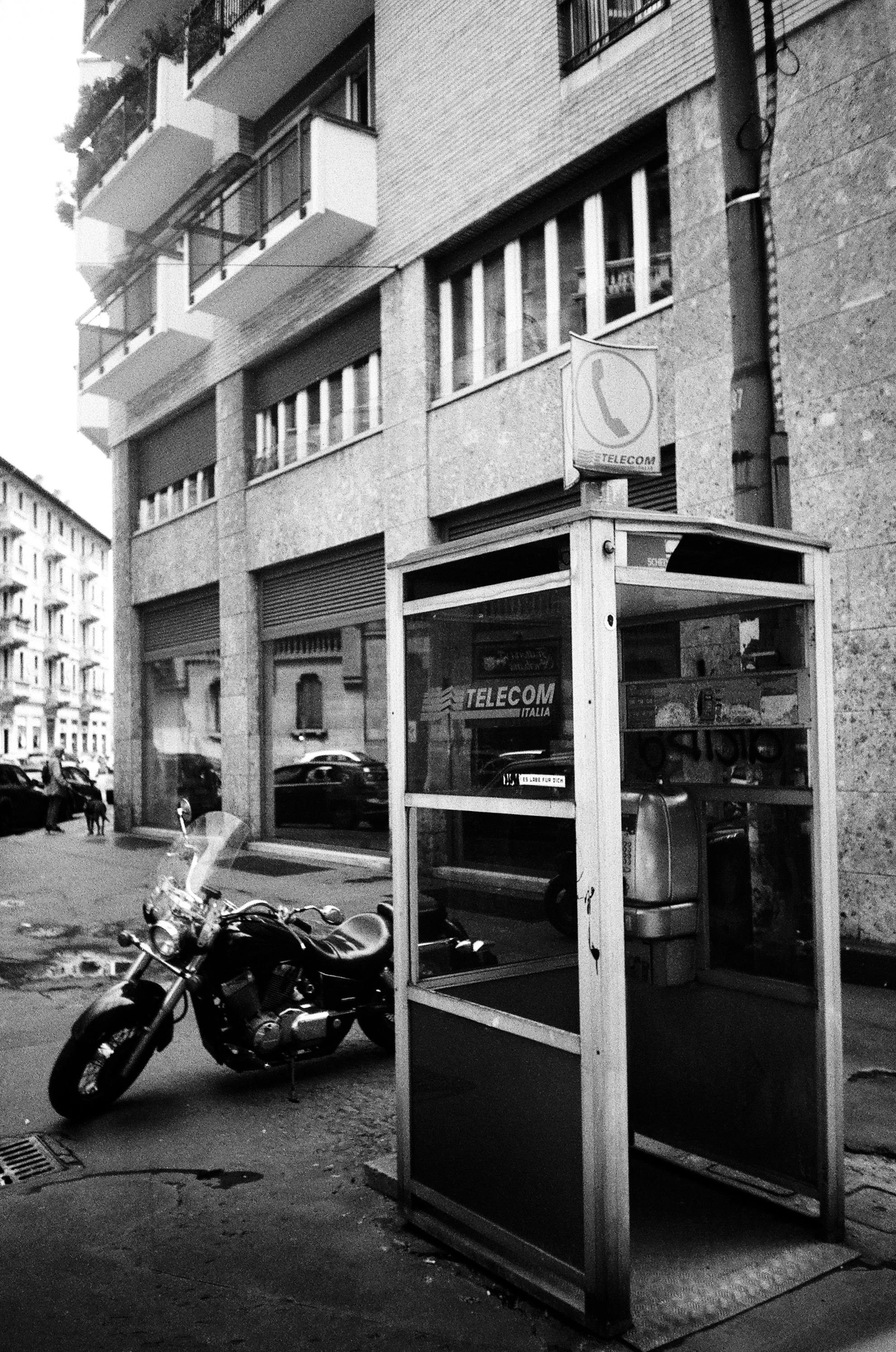 Classic Red British Phone Booth Decorated with Artificial Rose Flowers ...